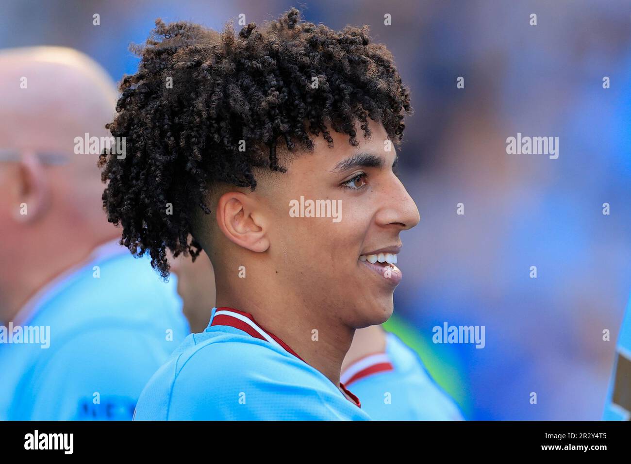 Rico Lewis #82 of Manchester City walks to the presentation podium ...