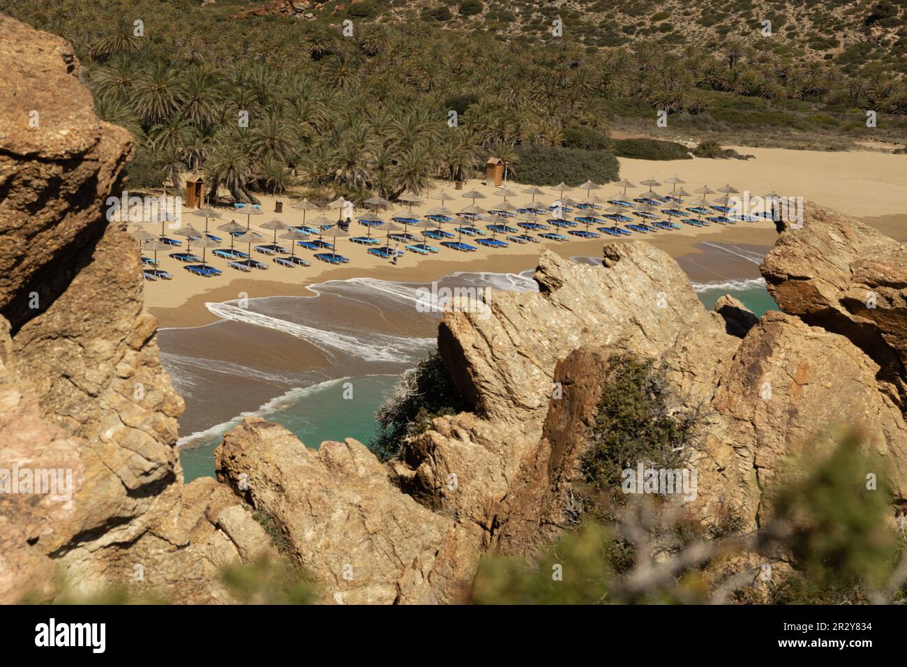 The coastline of Vai beach with a wild date forest, view from above ...