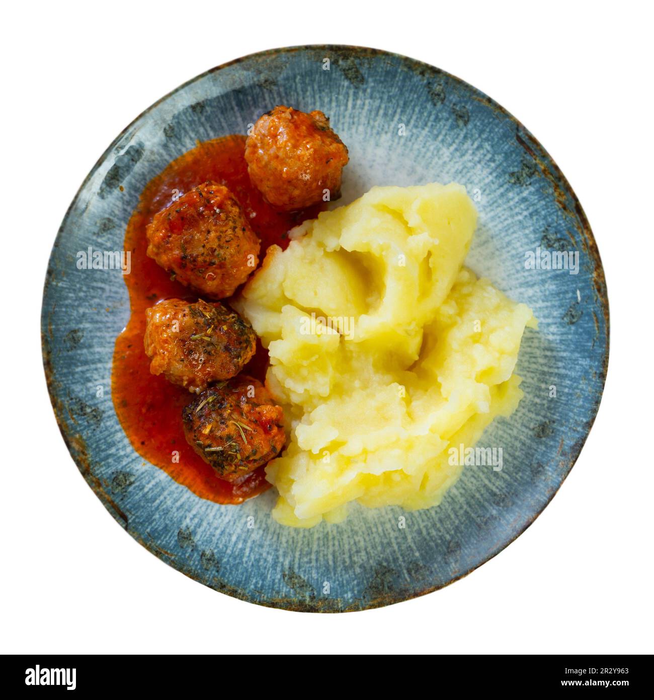 Delicious serving of meatballs served with mashed potatoes and gravy ...