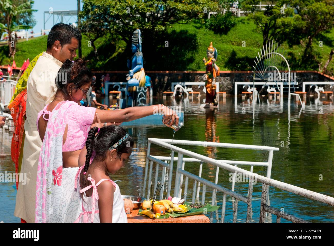 Pilgrims paying homage, Indian Ocean, Sacred Hindu Lake of Ganga Talao ...