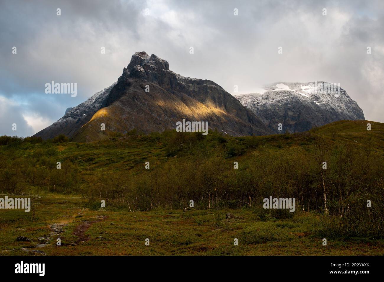 Sunrise light on the mountain sides of Nallo massif along the hiking ...