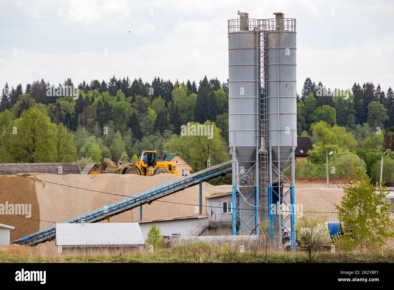 View of towers and mound of gravel at a concrete plant: Vashutino ...