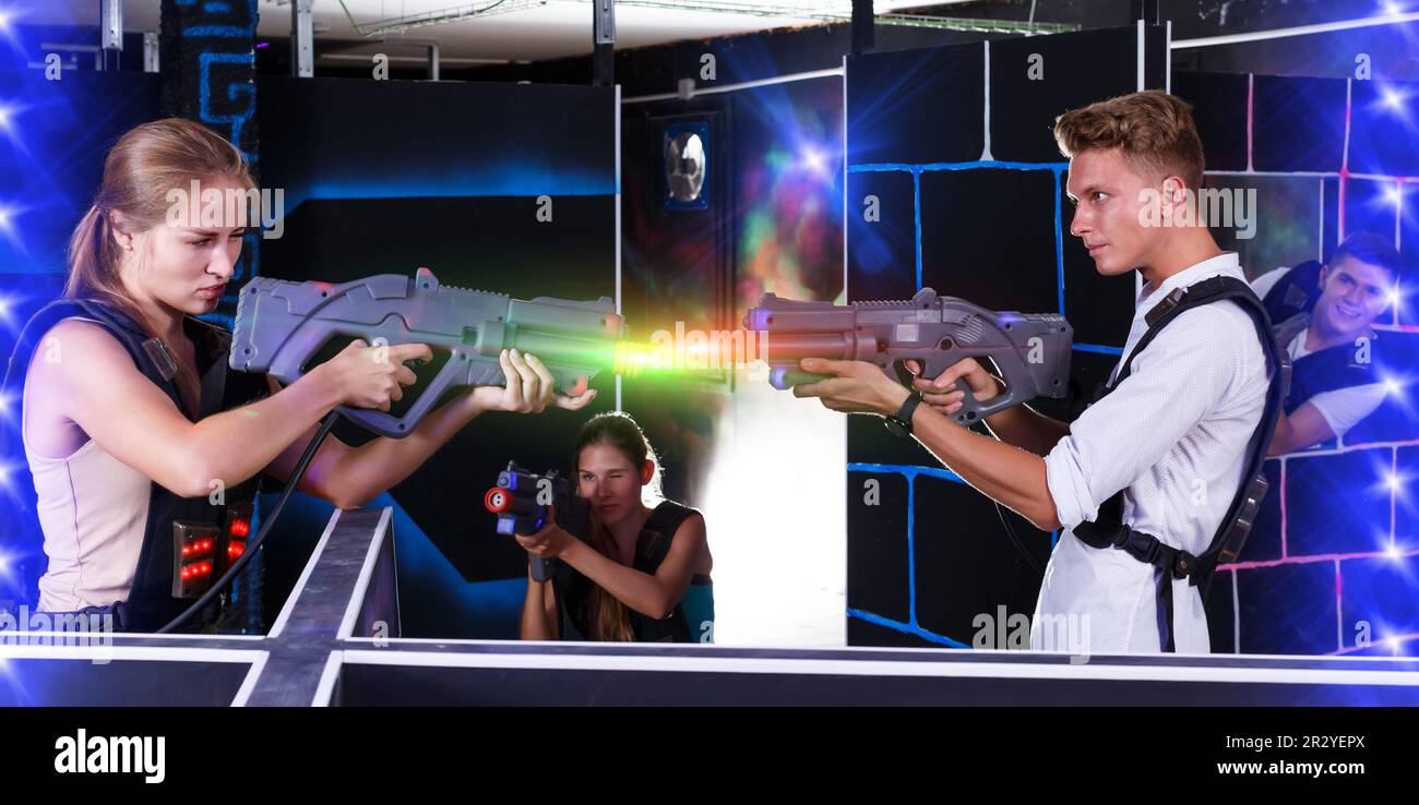 Two laser tag teams playing indoors Stock Photo - Alamy