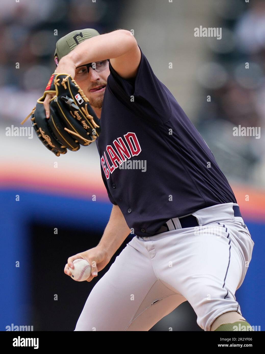 Cleveland Guardians starting pitcher Tanner Bibee (61) throws in the ...