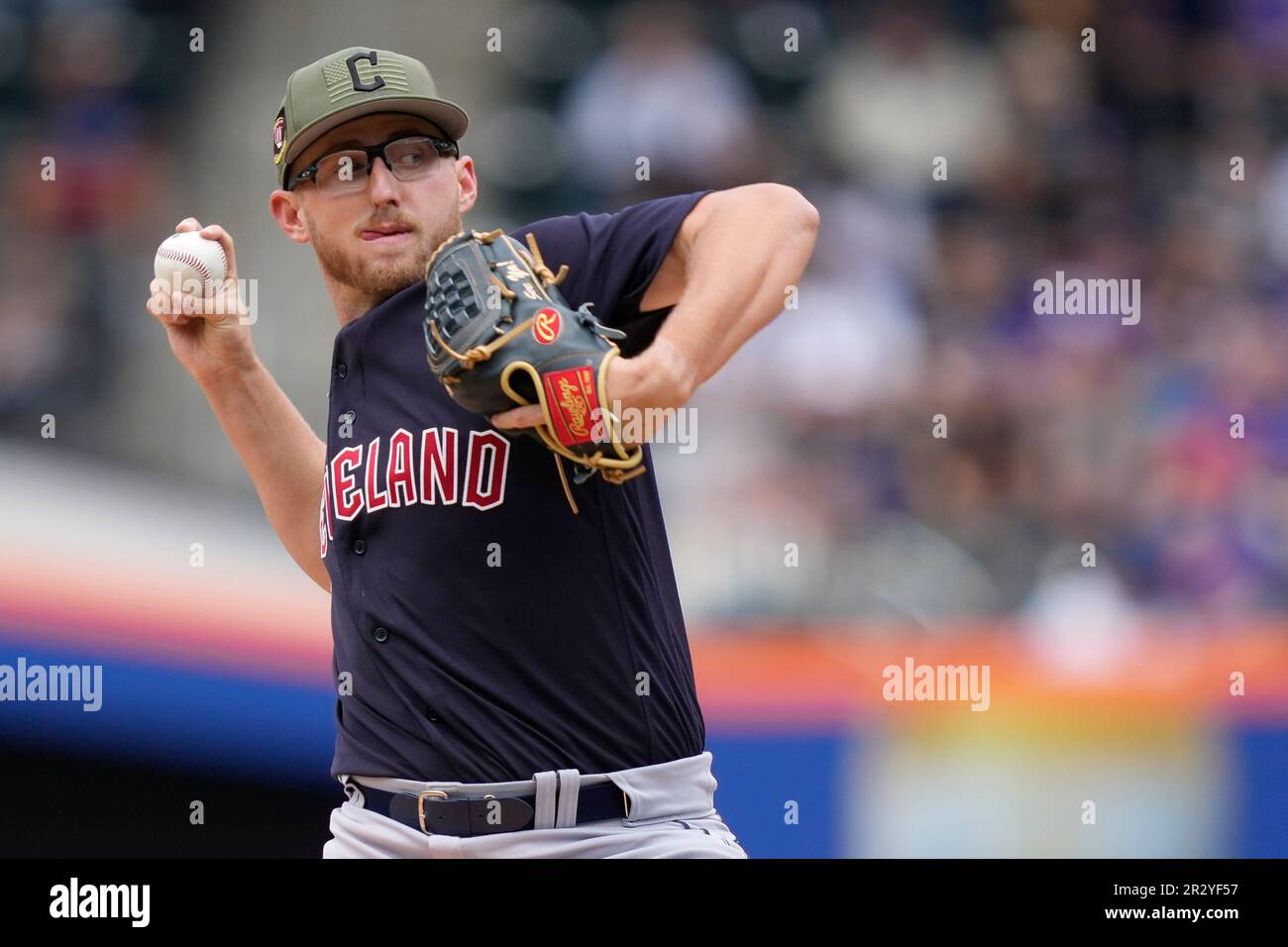 Cleveland Guardians starting pitcher Tanner Bibee (61) throws in the ...