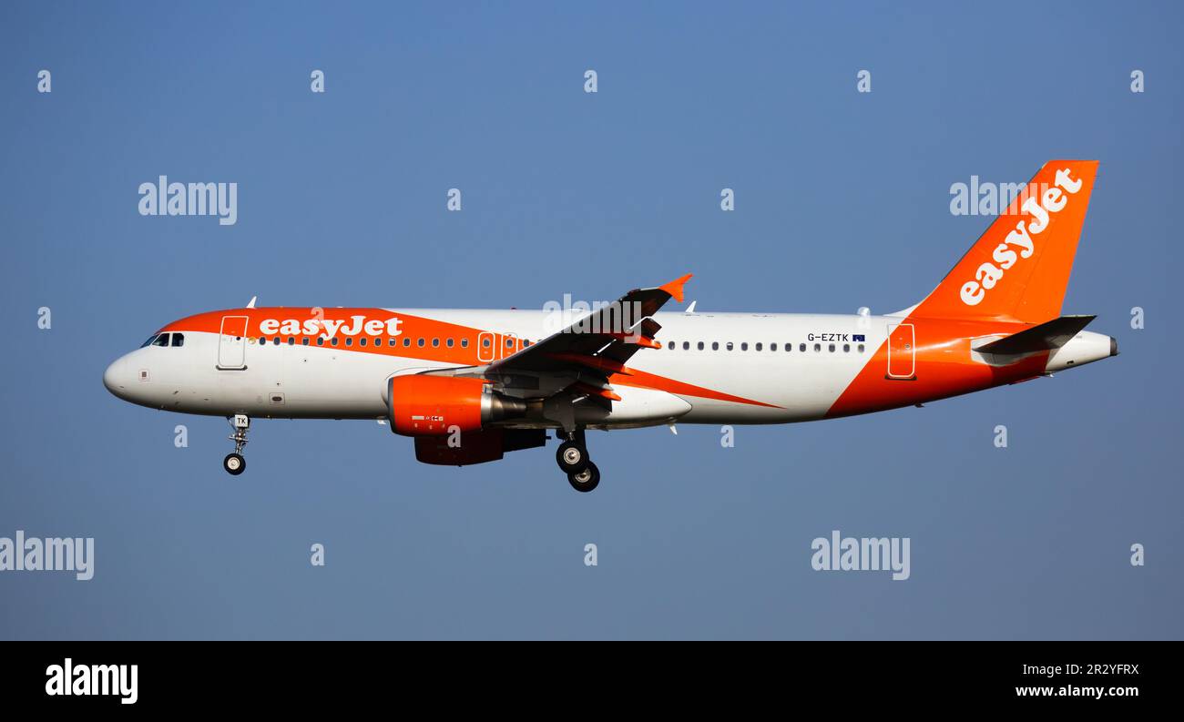 Airplane EasyJet airline lands on the runway in an aeroport El Prat ...
