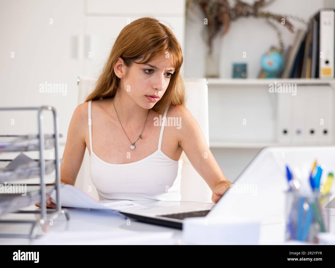 Angry female manager experiencing emotions in modern office Stock Photo ...