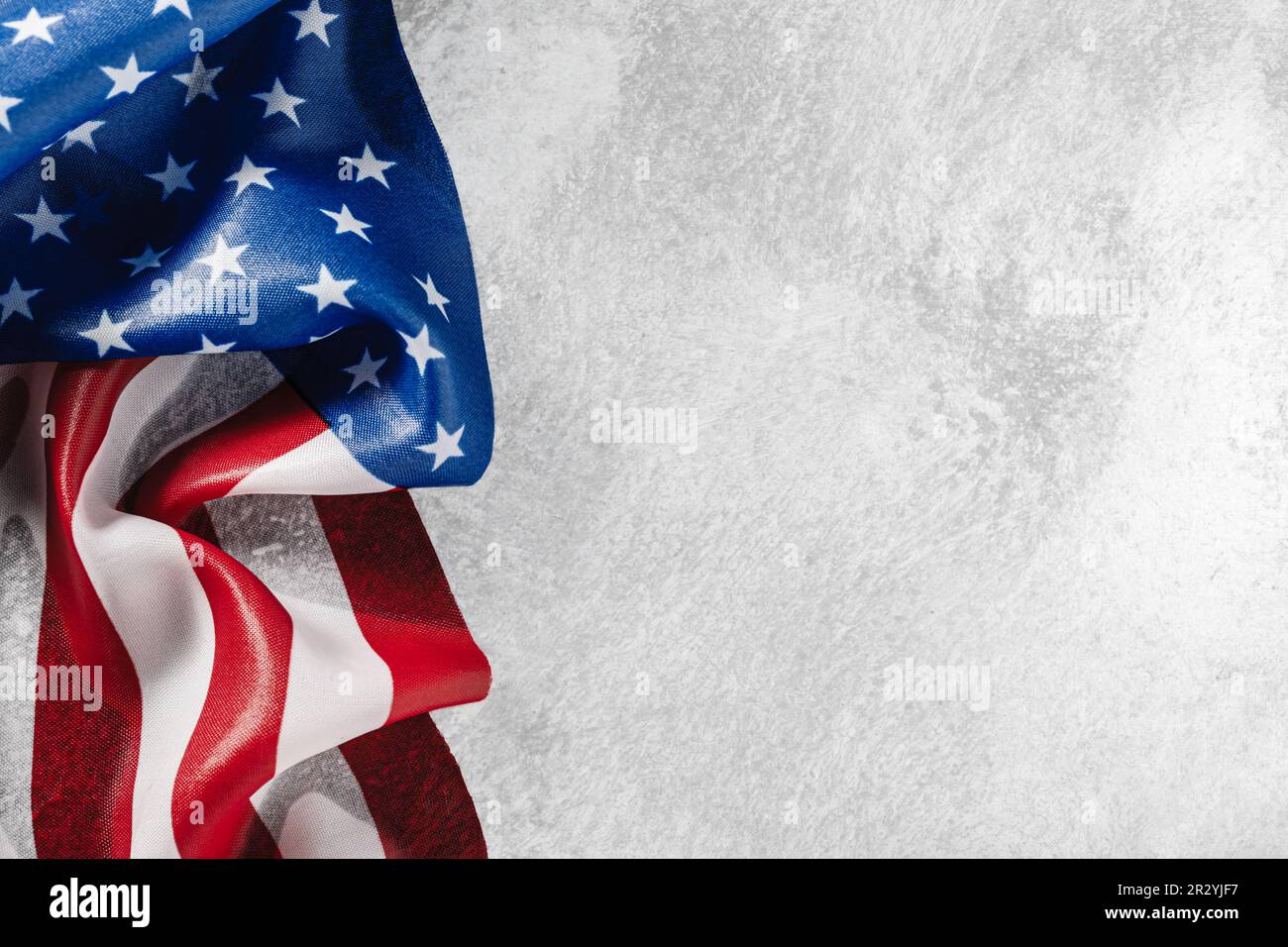 Ruffled USA flag on bright white background with copyspace for text. US ...