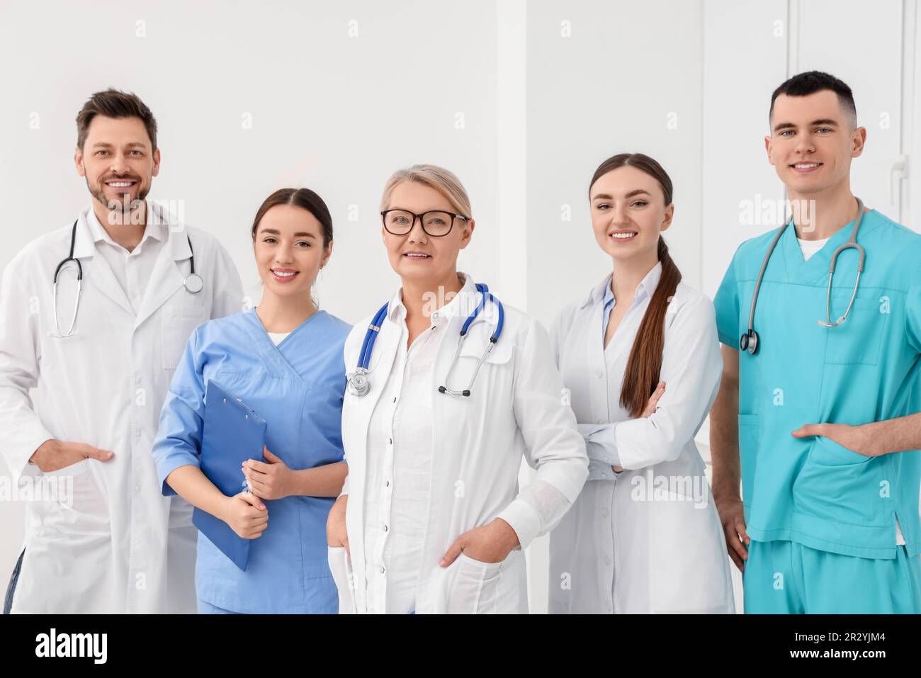 Portrait of medical doctors wearing uniforms indoors Stock Photo - Alamy