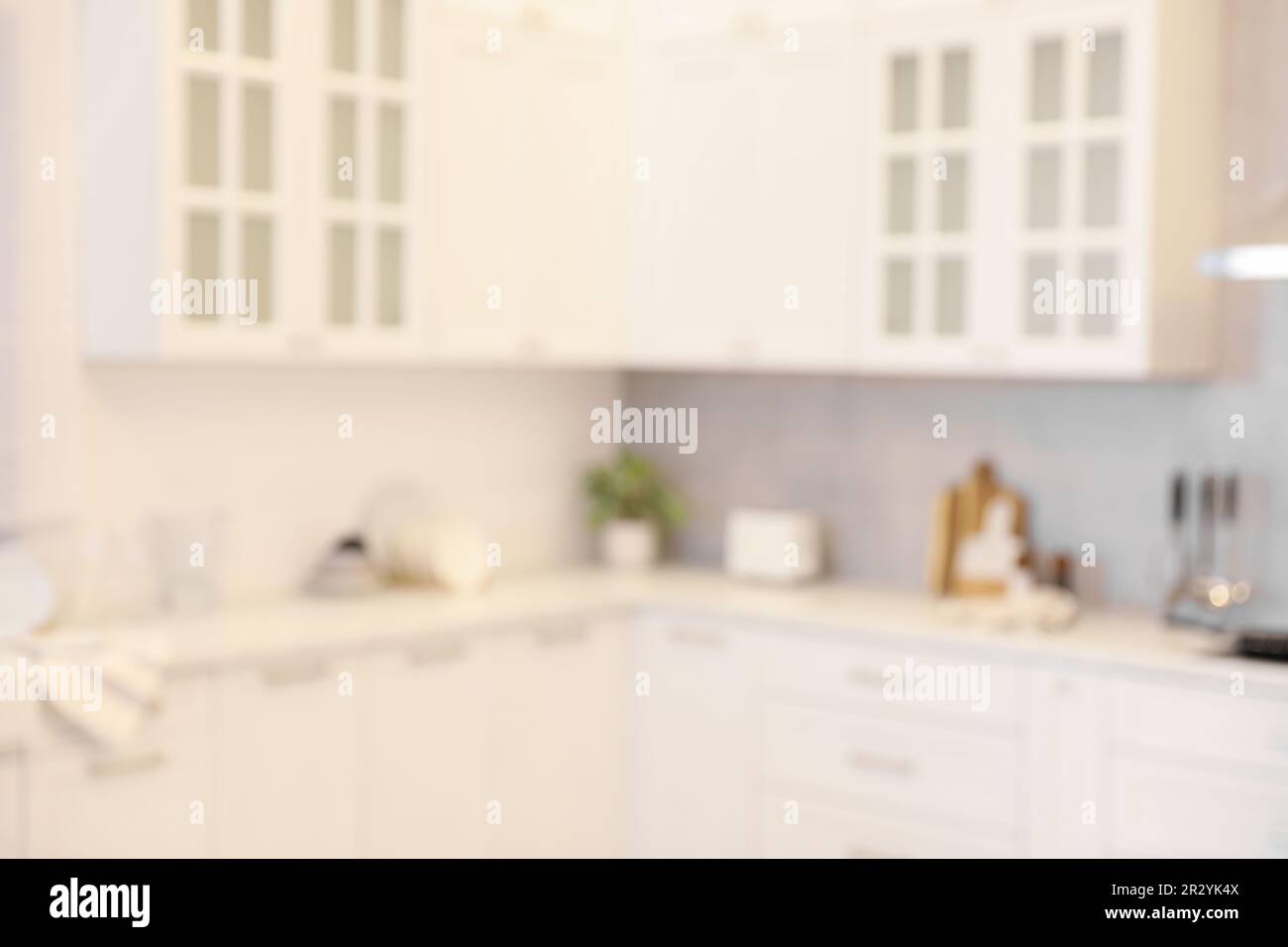 Blurred view of modern kitchen. Interior design Stock Photo - Alamy