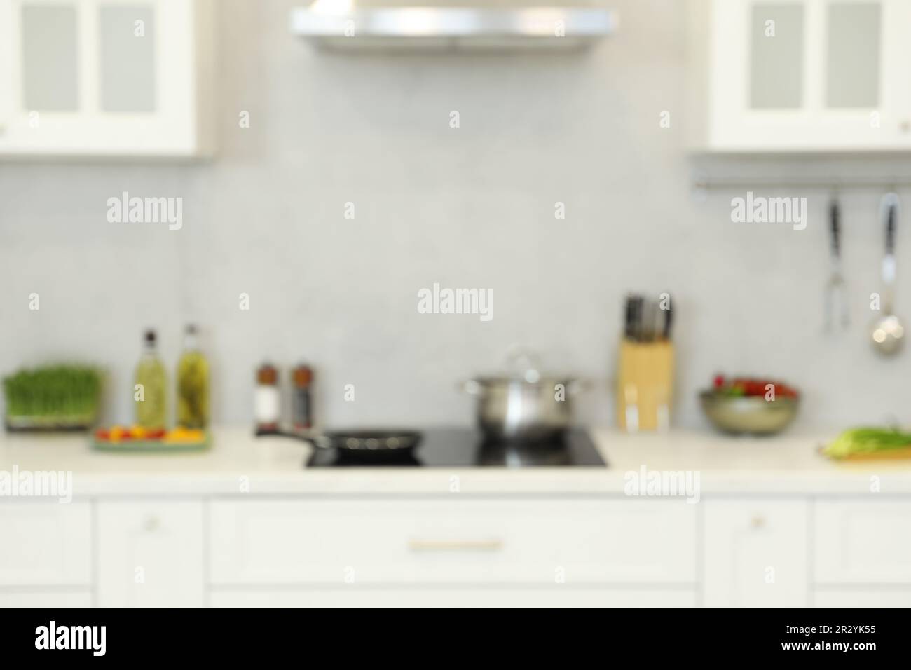 Blurred view of modern kitchen. Interior design Stock Photo - Alamy