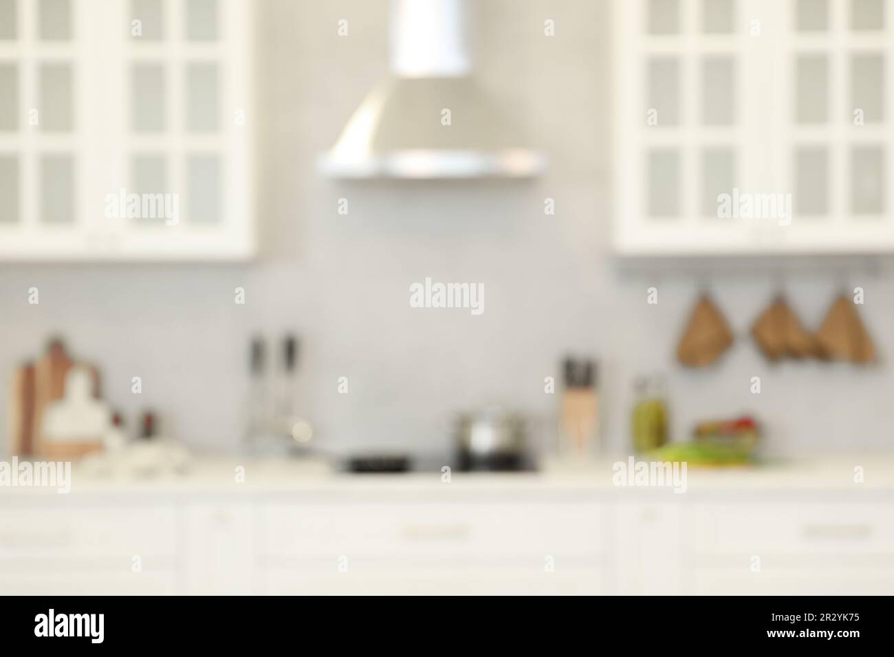 Blurred view of modern kitchen. Interior design Stock Photo - Alamy