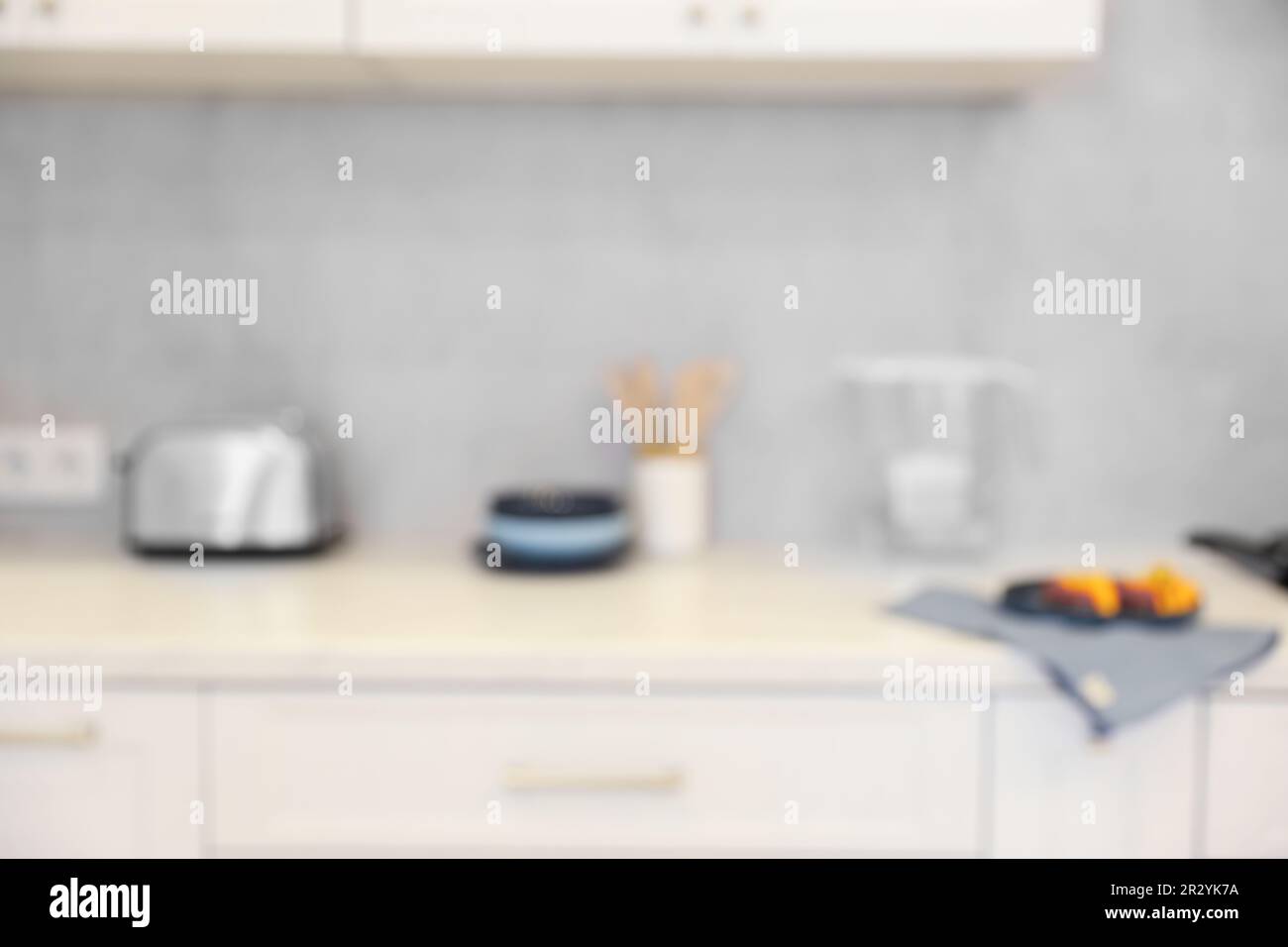 Blurred view of modern kitchen. Interior design Stock Photo - Alamy