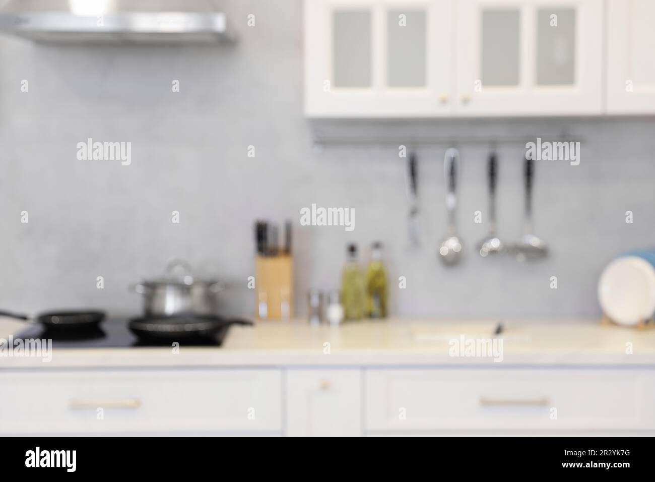 Blurred view of modern kitchen. Interior design Stock Photo - Alamy