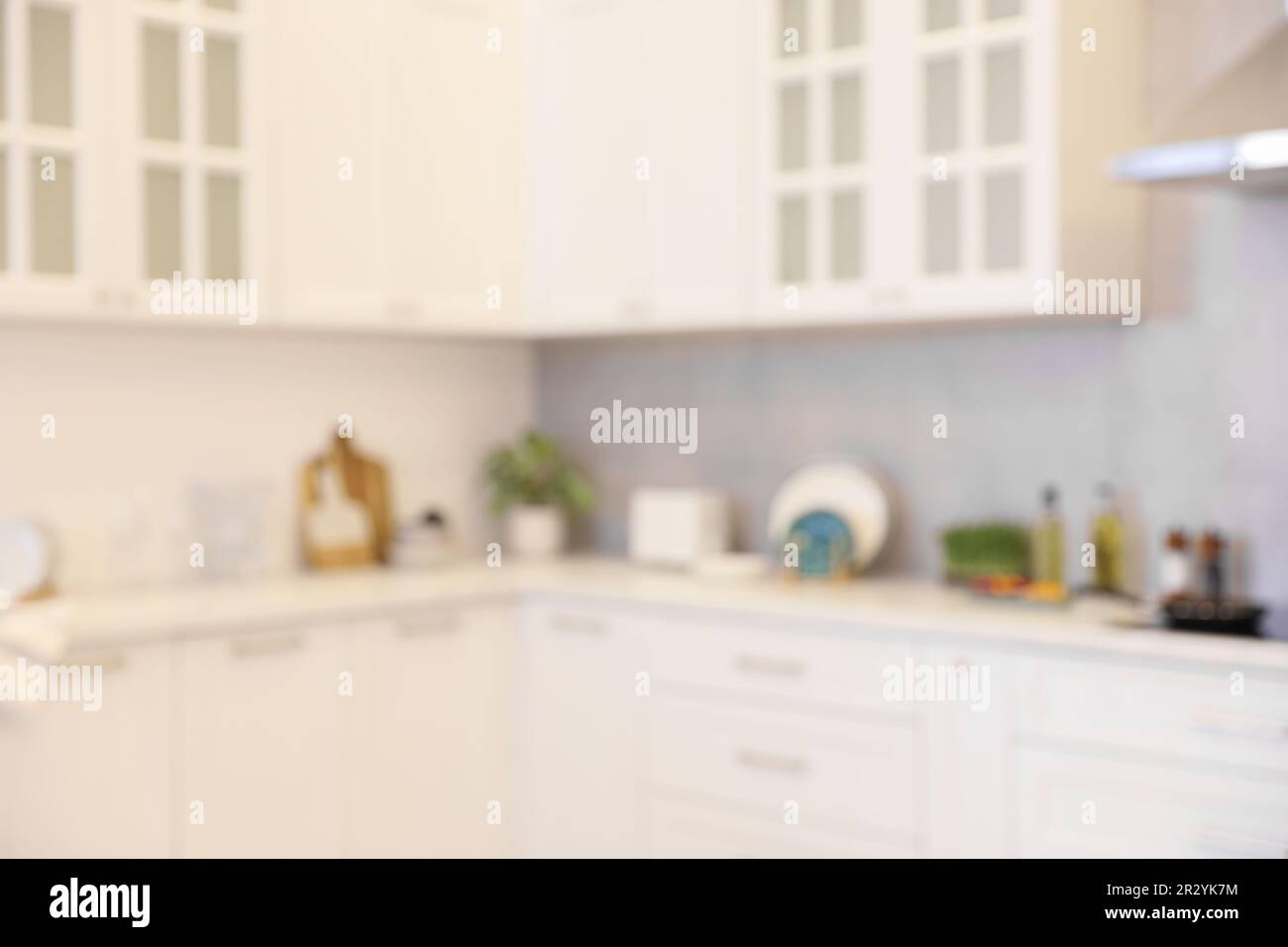Blurred view of modern kitchen. Interior design Stock Photo - Alamy