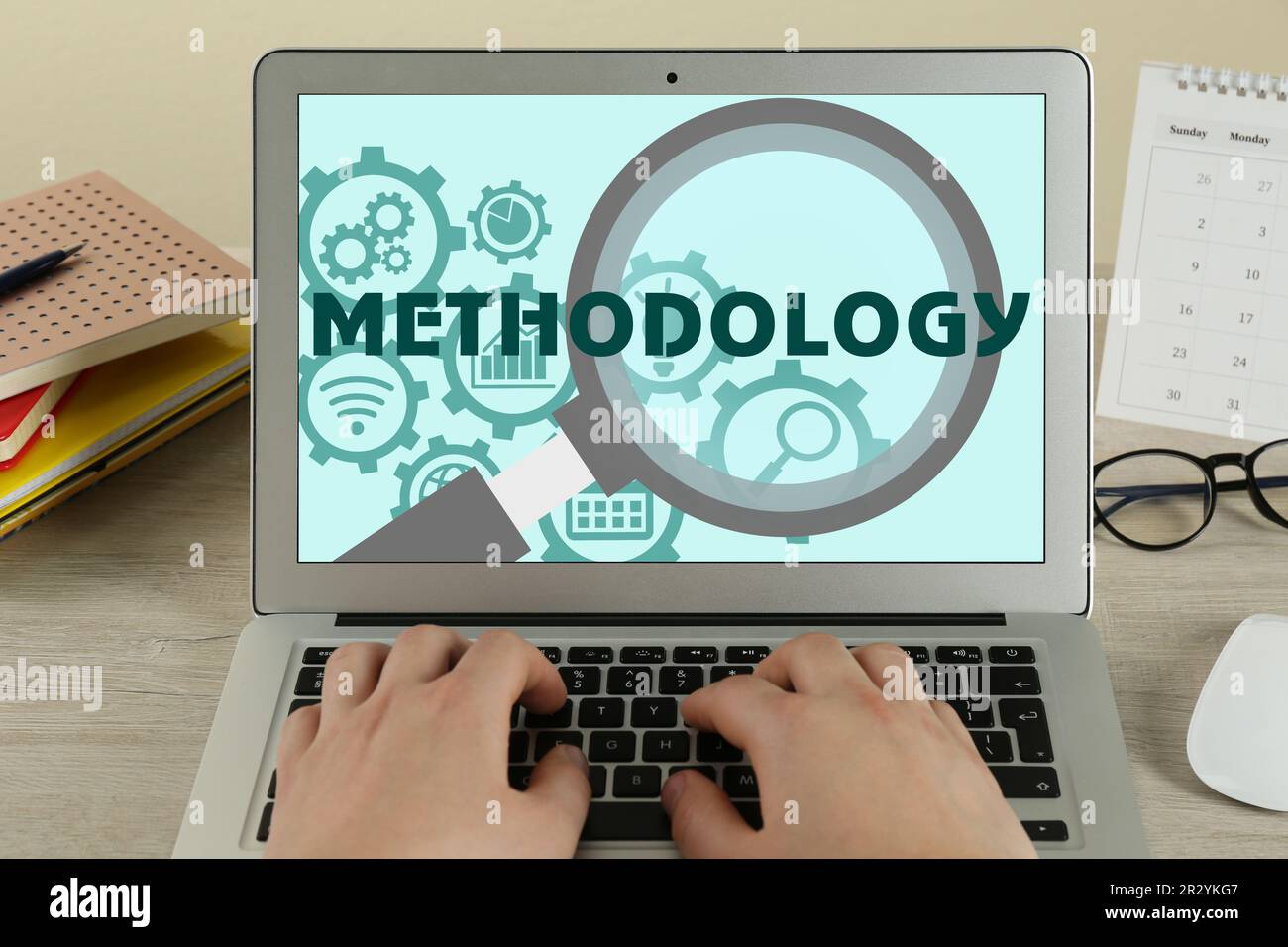 Methodology concept. Woman using modern laptop at table indoors ...