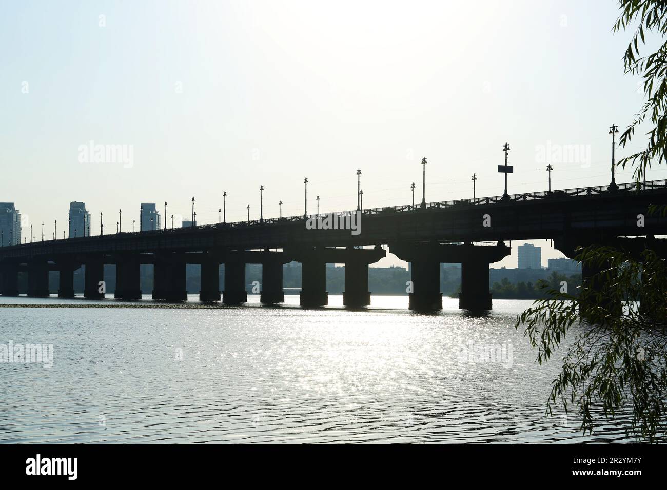 Beautiful view of beam bridge over river on sunny day Stock Photo - Alamy