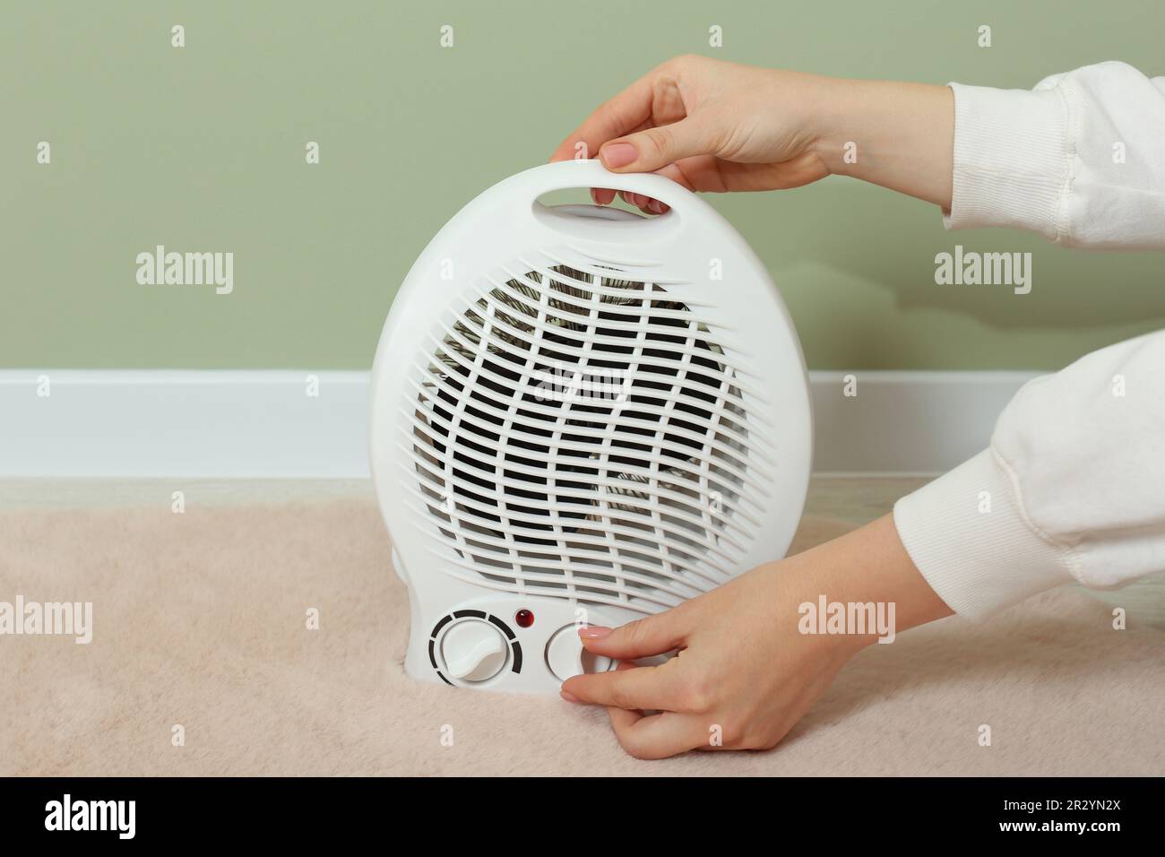 Woman electrical fan hi-res stock photography and images - Alamy