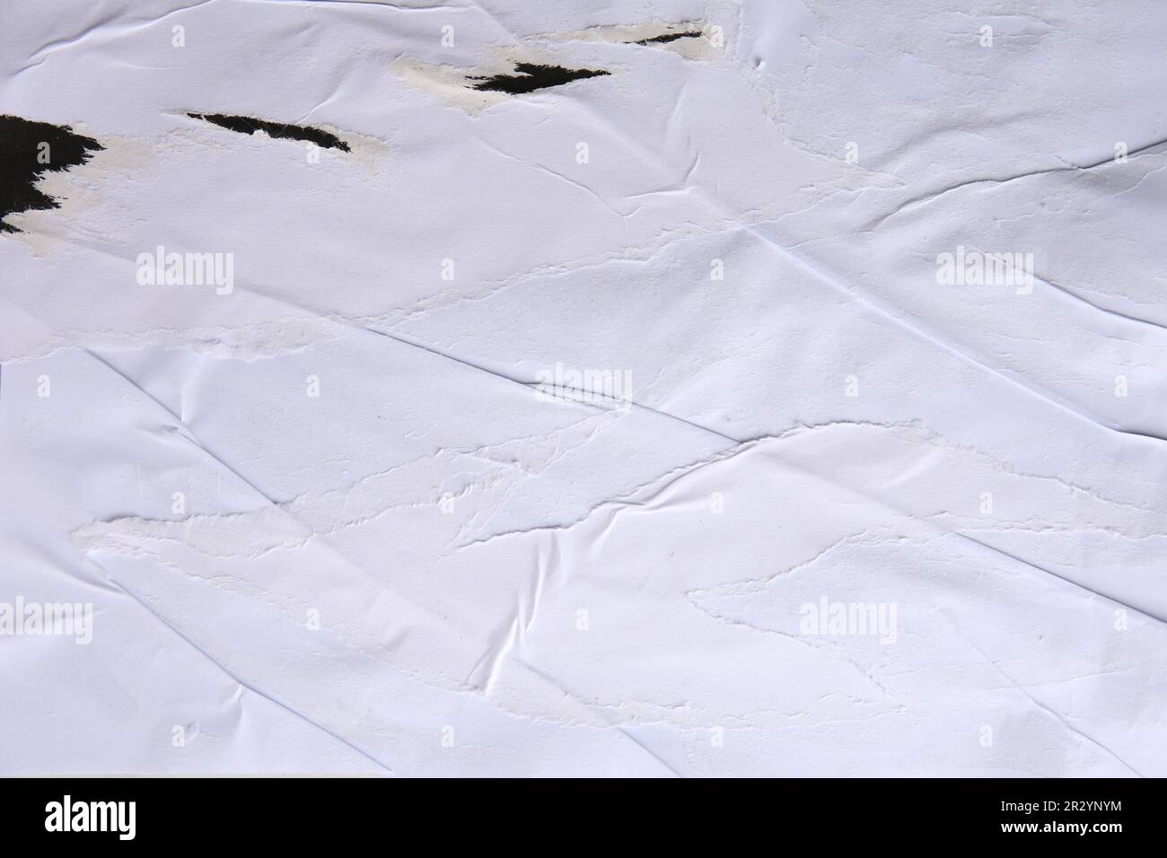 Texture of ripped paper poster, closeup view Stock Photo - Alamy