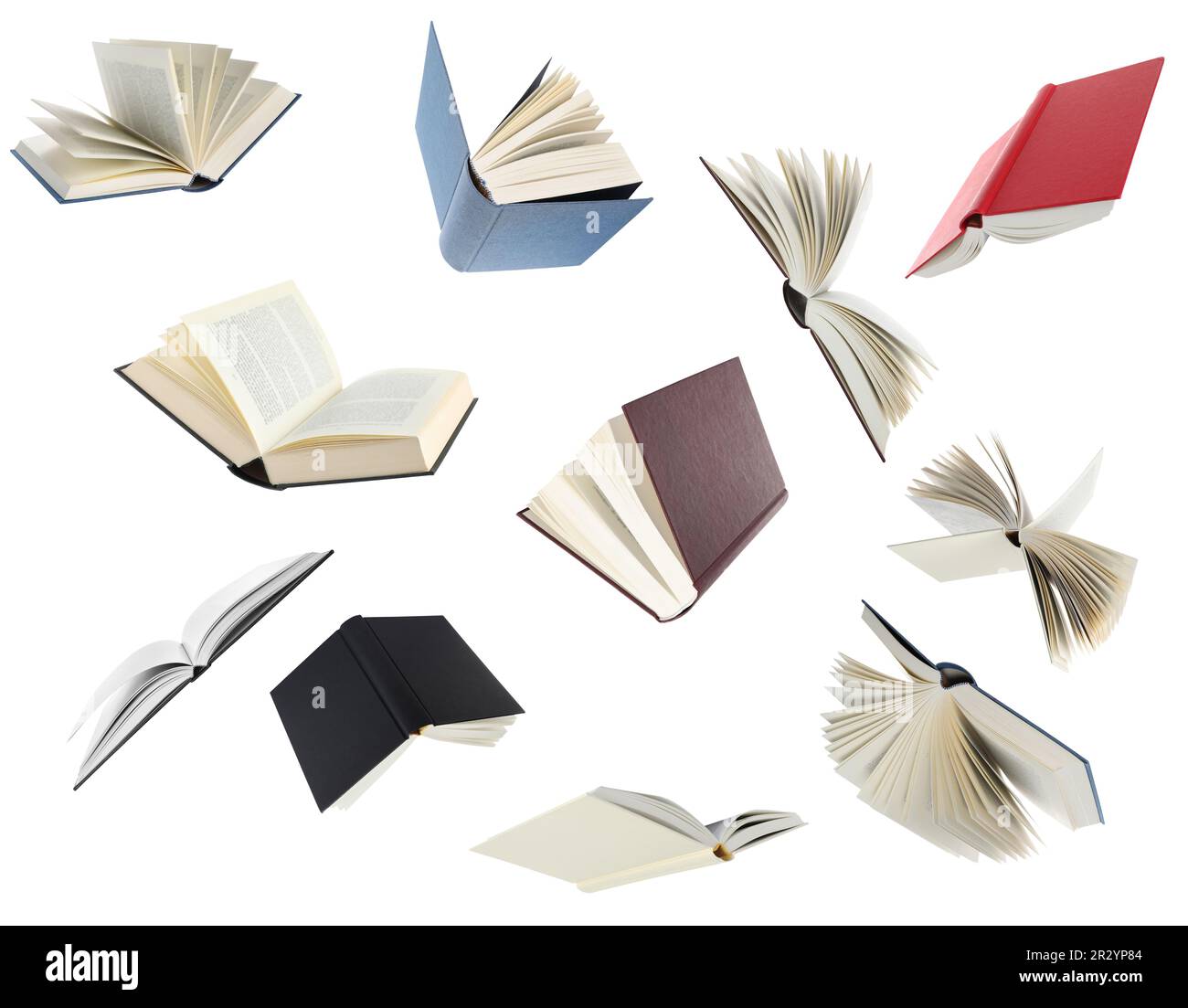Many hardcover books falling on white background Stock Photo - Alamy