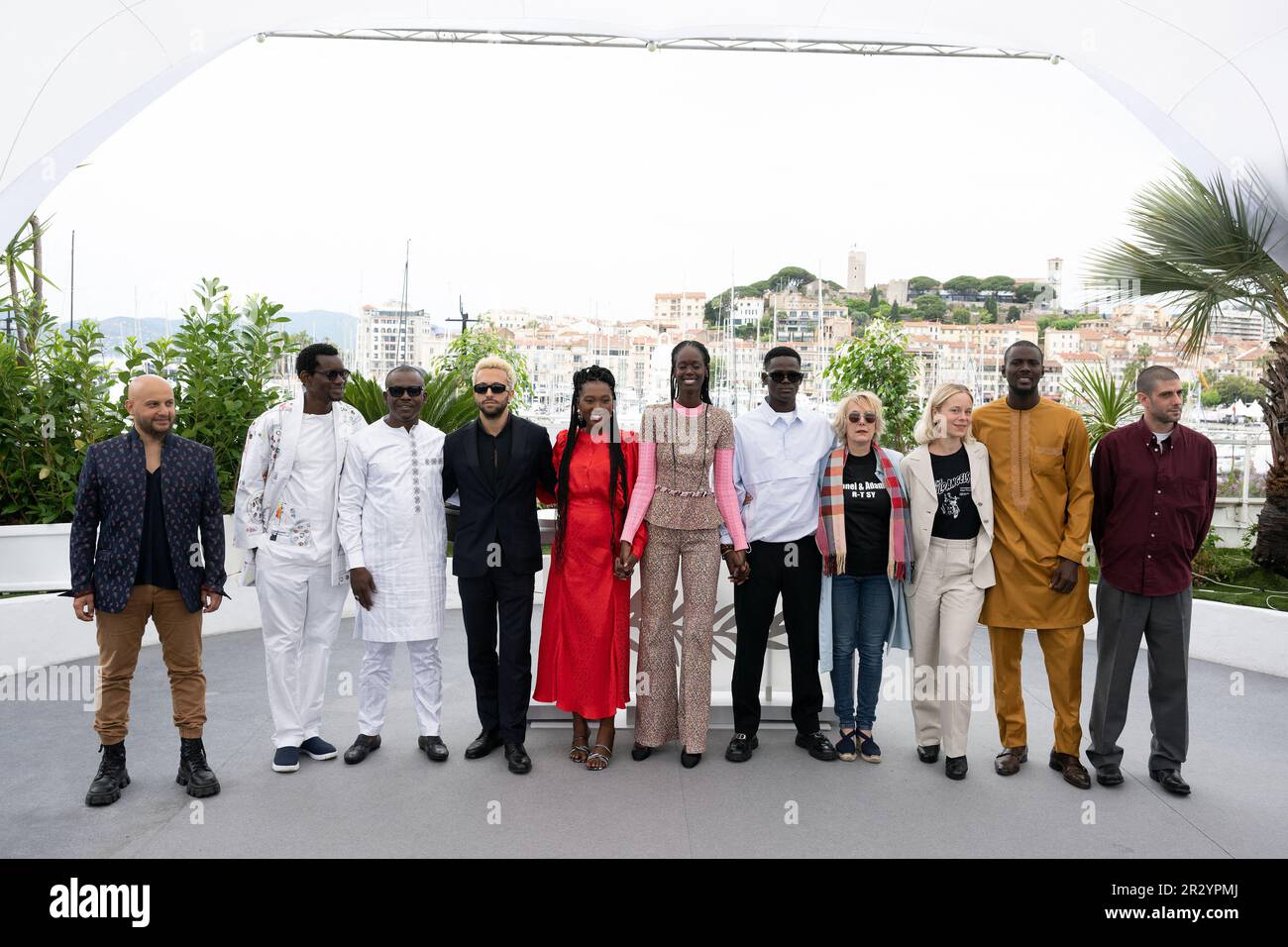 Cannes, France. 22nd May, 2023. Bachar Khalife, a guest, Oumar Gabar Sy ...
