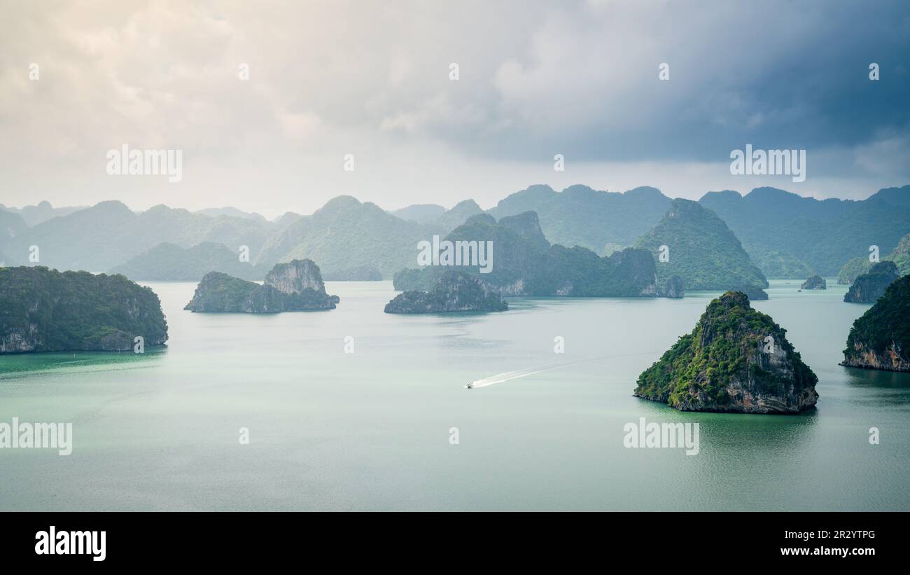 Beautiful limestone karst islands of Ha Long Bay in Vietnam. View from ...