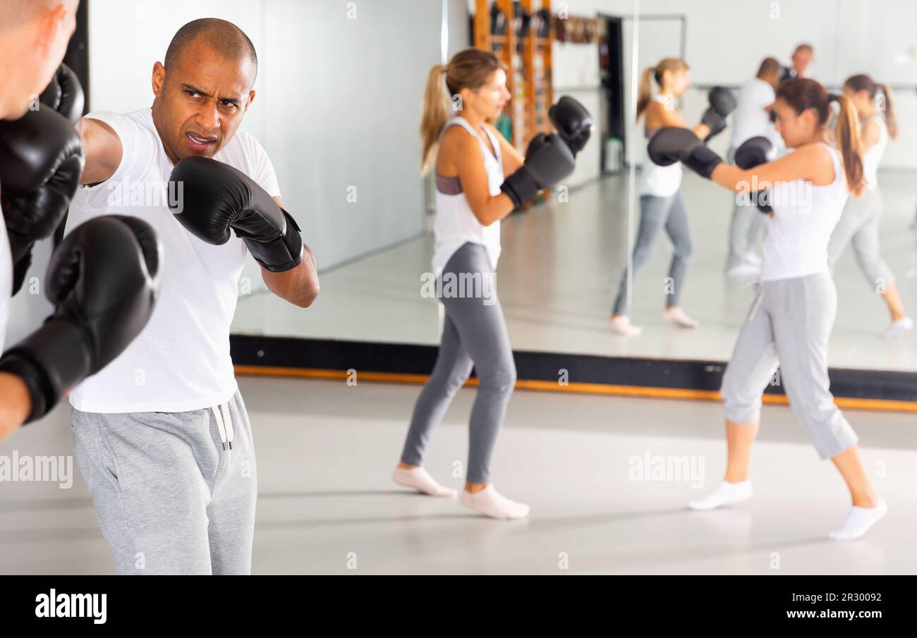 Two men practicing self defense techniques in sports club Stock Photo ...