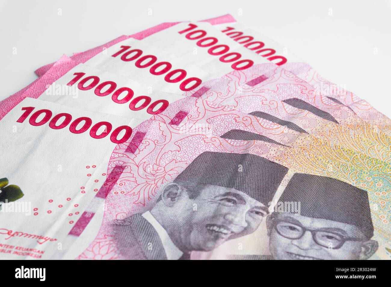 Indonesian banknotes worth IDR 100,000 Rupiah. Rupiah banknotes issued ...