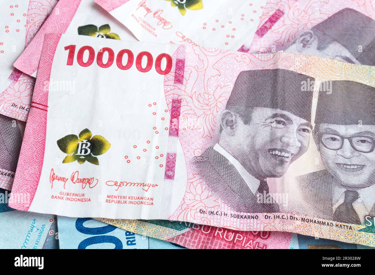 Indonesian banknotes worth IDR 100,000 Rupiah. Rupiah banknotes issued ...