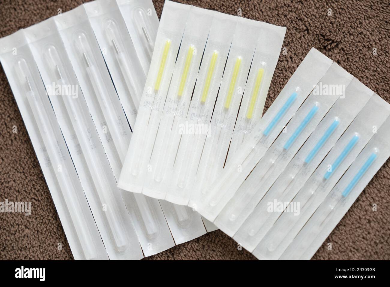 A collection of unopened acupuncture needles in a package Stock Photo ...