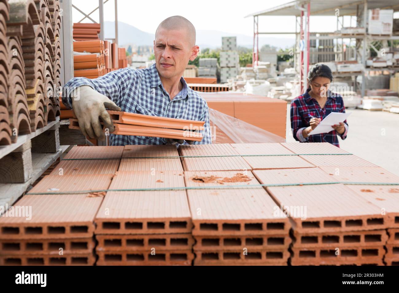 Man arranging bricks hi-res stock photography and images - Alamy