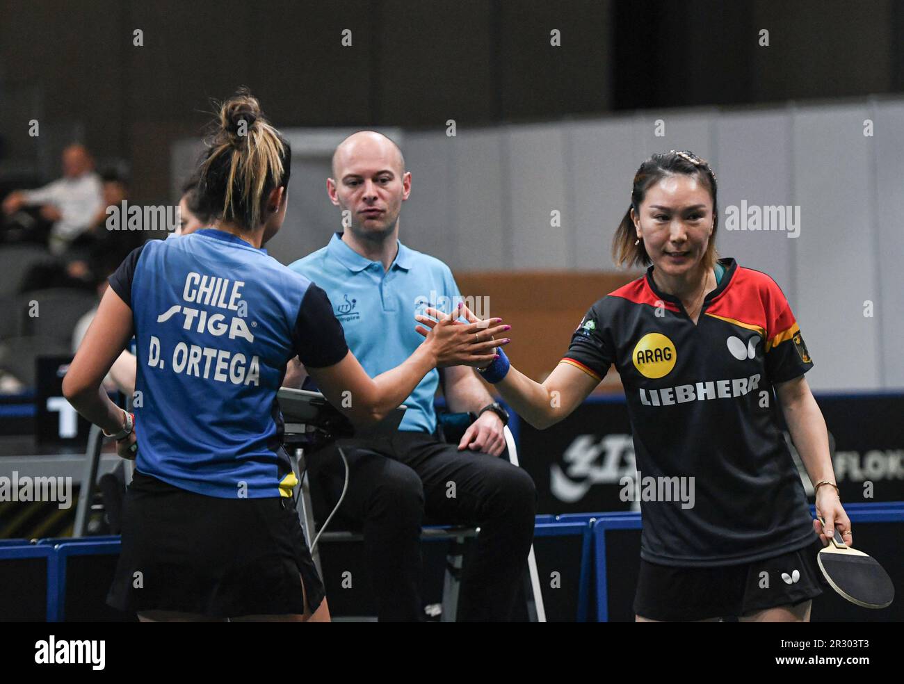 Durban, South Africa. 21st May, 2023. Shan Xiaona (R) reacts with ...