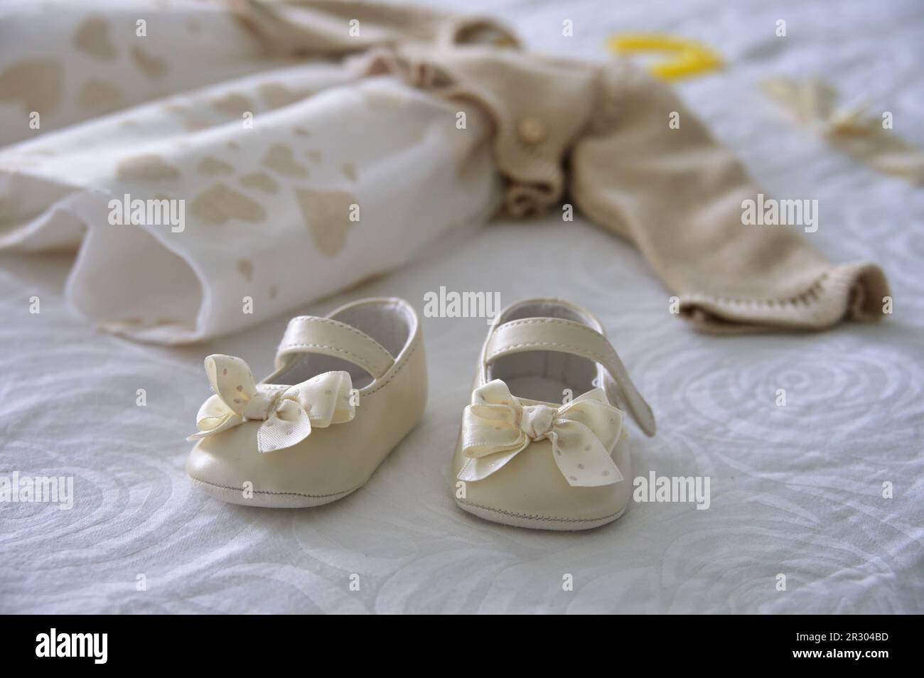 Christening background with baptism baby dress and shoes Stock Photo ...