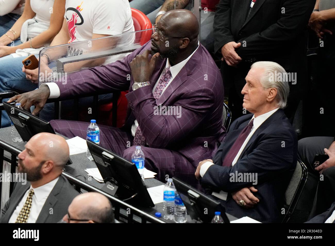 Miami Heat president Pat Riley sits with former player Shaquille O'Neal ...