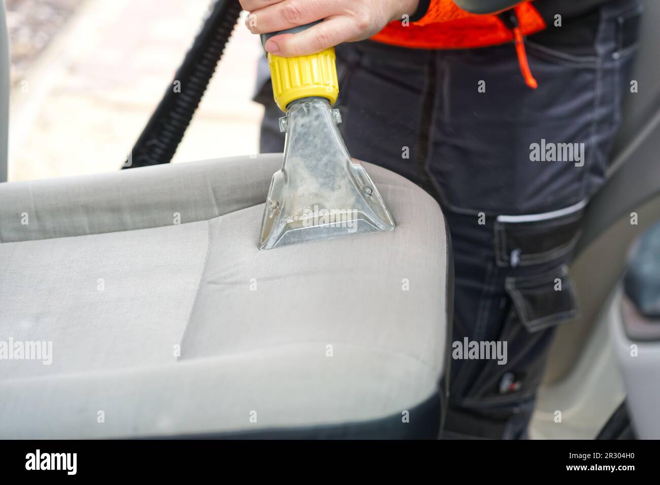 car dry cleaning. Light gray textile seats chemical cleaning with ...