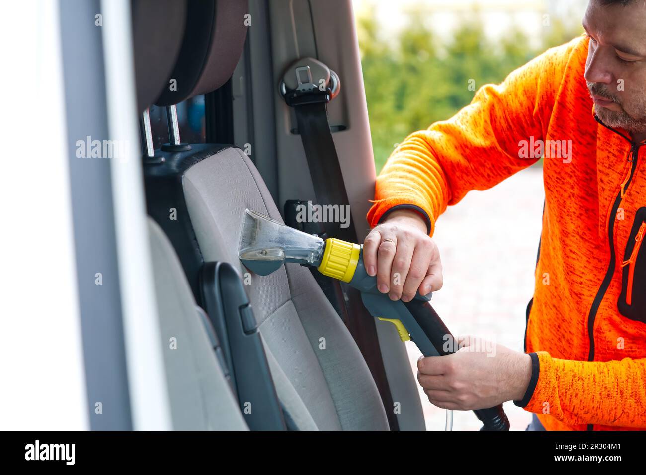 car dry cleaning. Light gray textile seats chemical cleaning with ...