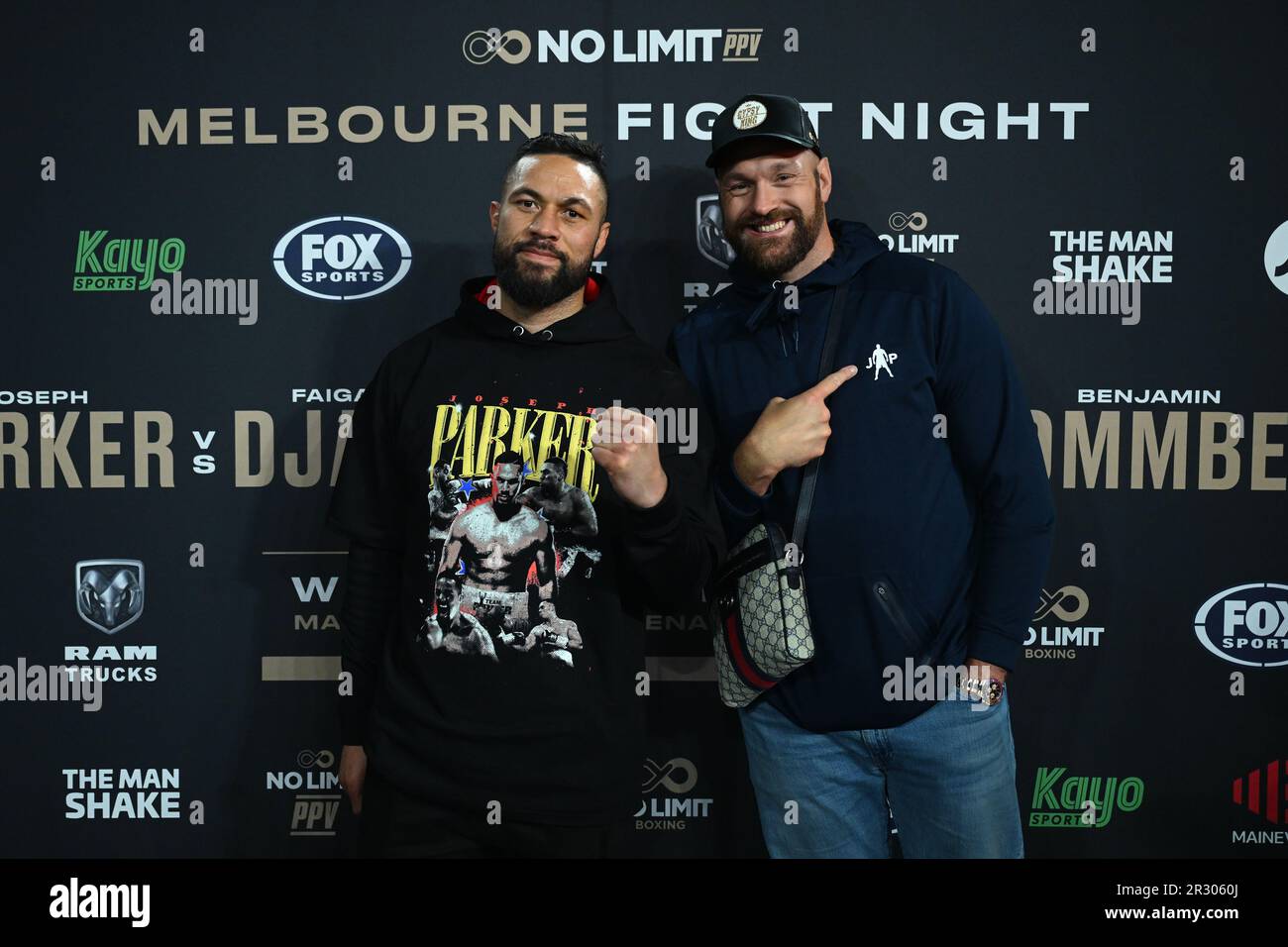 New Zealand boxer Joseph Parker (left) and Tyson Fury pose for photos ...