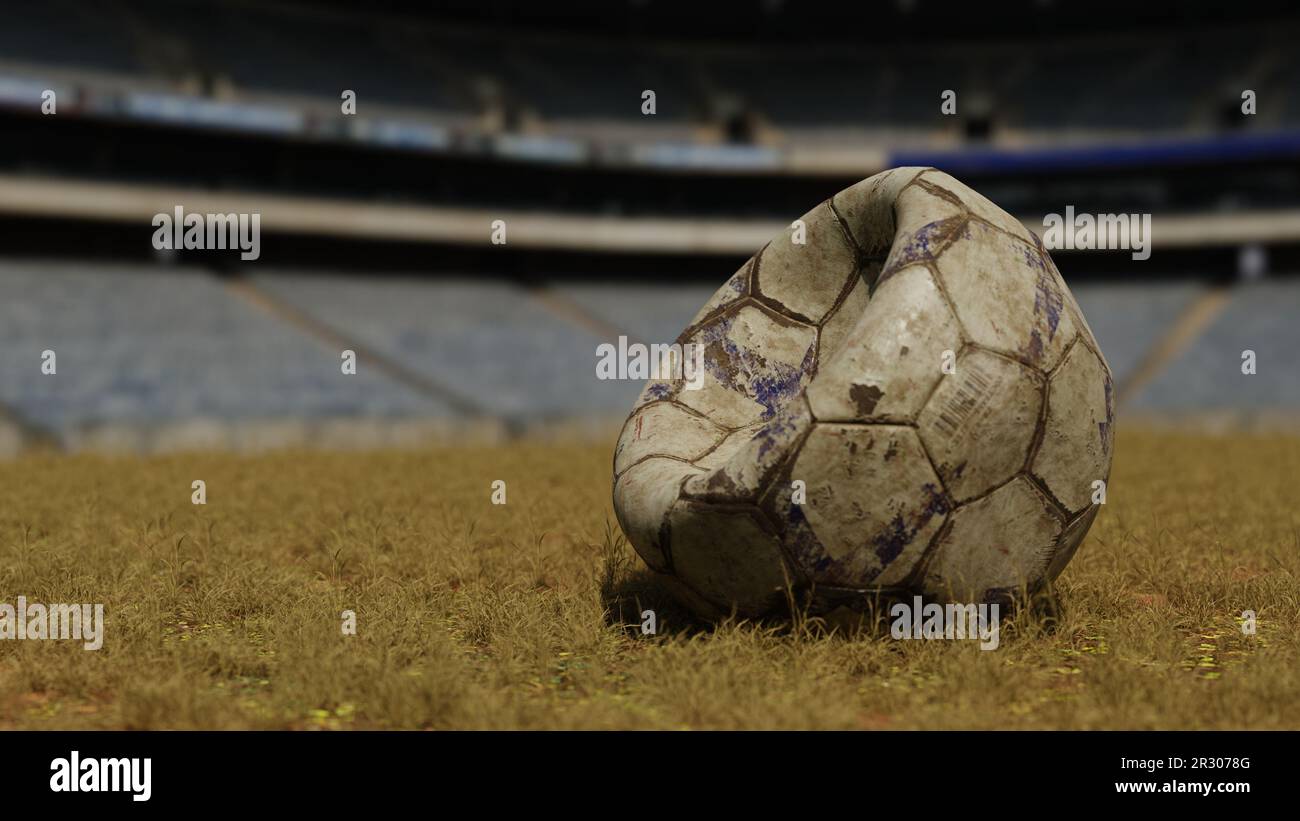 a deflated ball on grass in abandoned stadium Stock Photo - Alamy