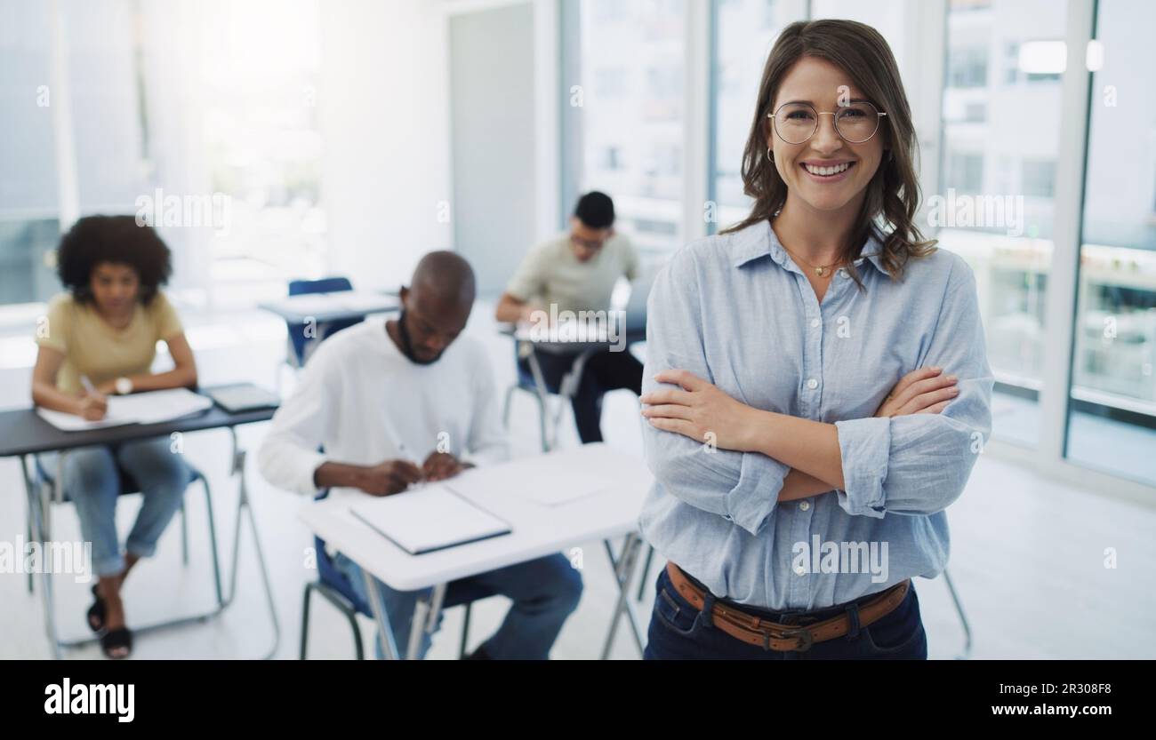 Education, portrait and woman professor in a classroom with students ...