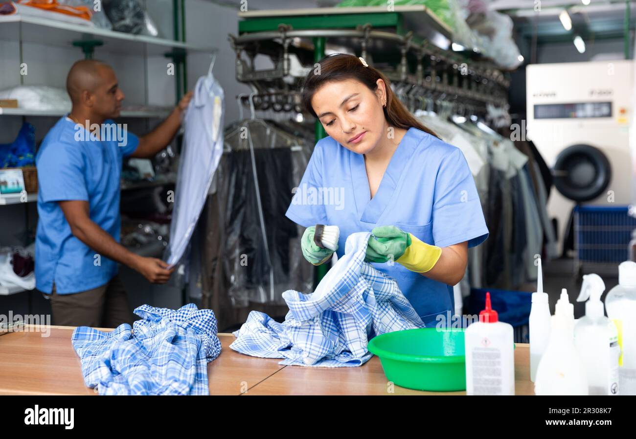 Portrait of female laundry worker during daily work Stock Photo - Alamy