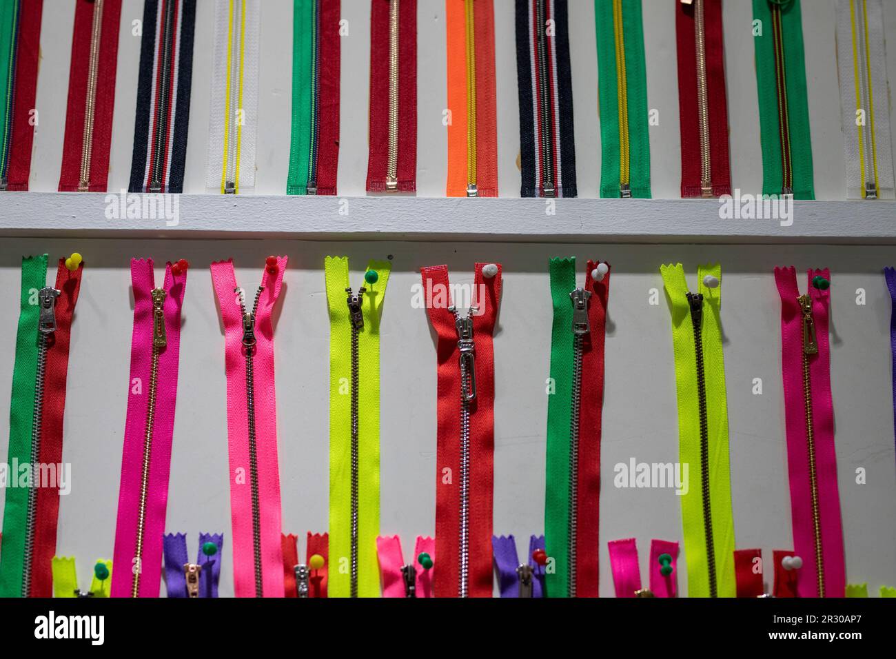 Colorful zipper collection on display at a stall of Bangladesh Denim ...