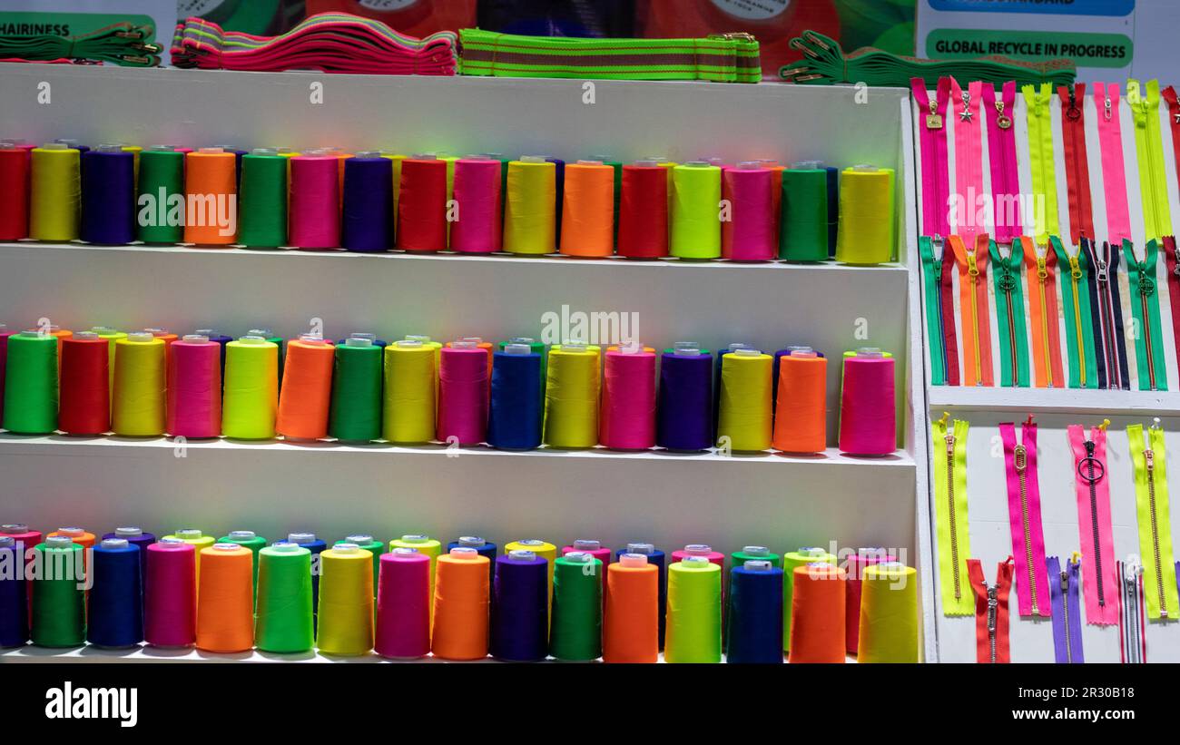 Spools of colorful threadSpools of colorful threadSpool and zippers are ...