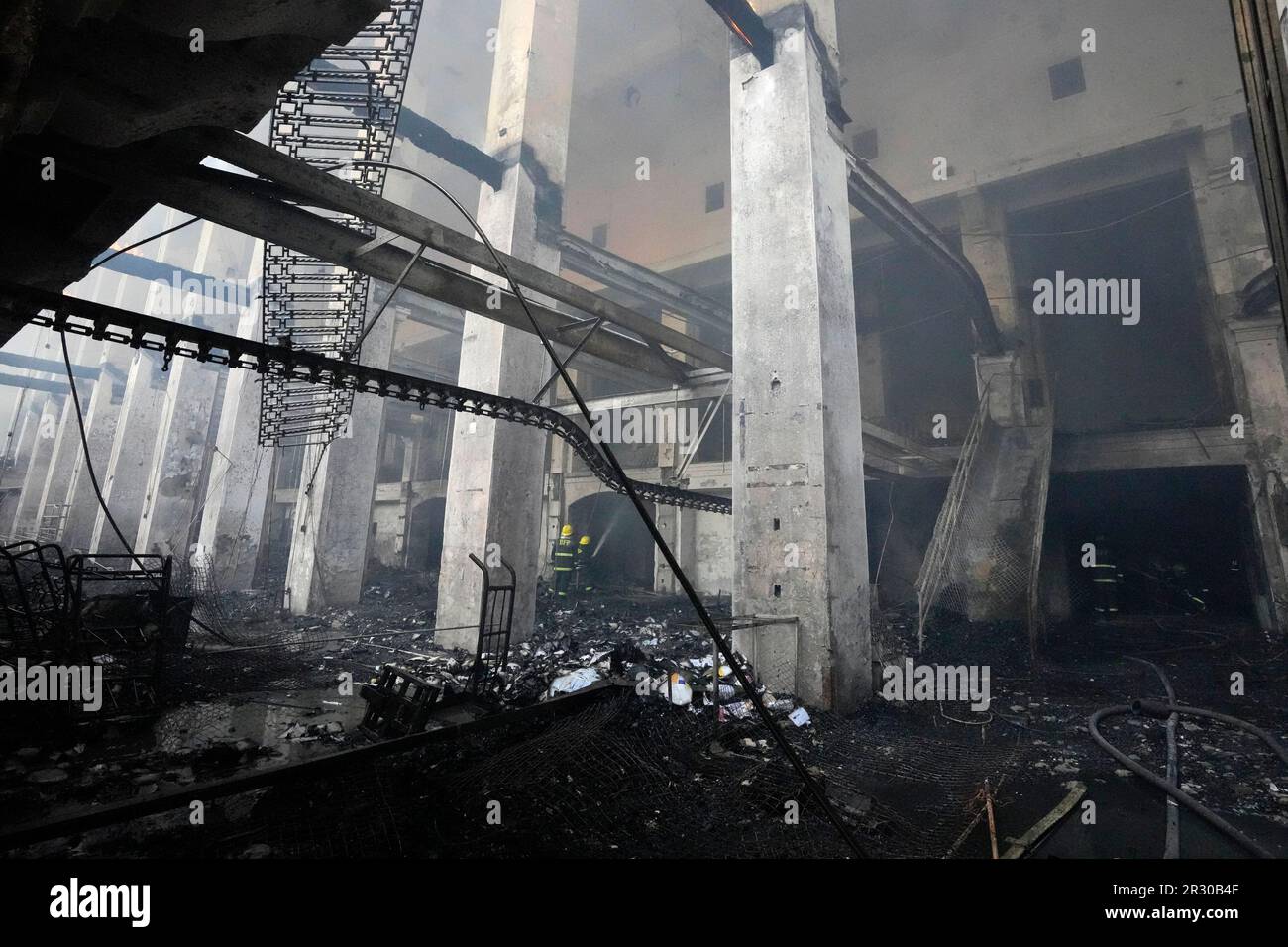 Firemen train their hoses inside the Manila Central Post Office after ...