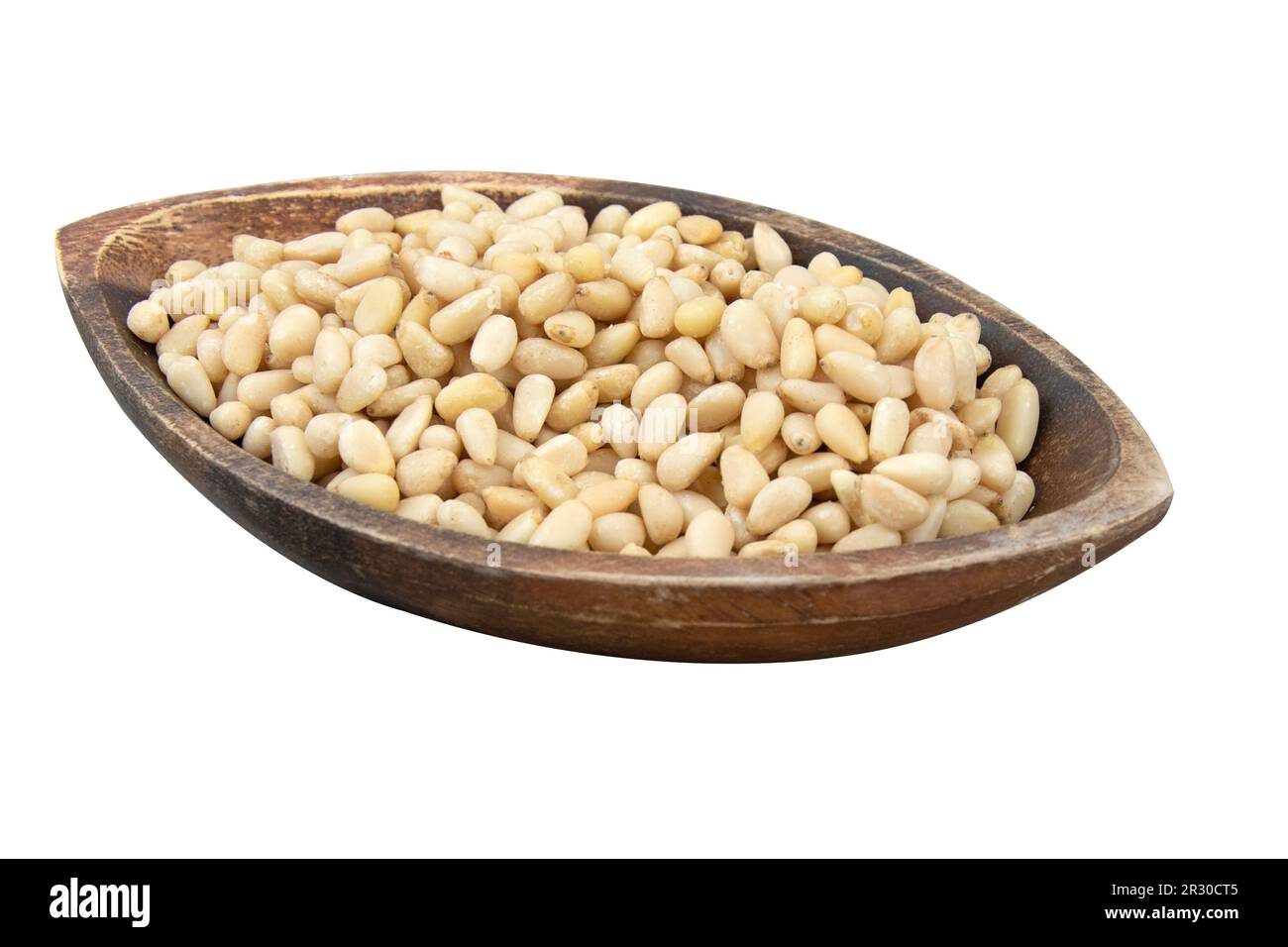 Pine nuts in bowl Cut Out Stock Images & Pictures - Alamy