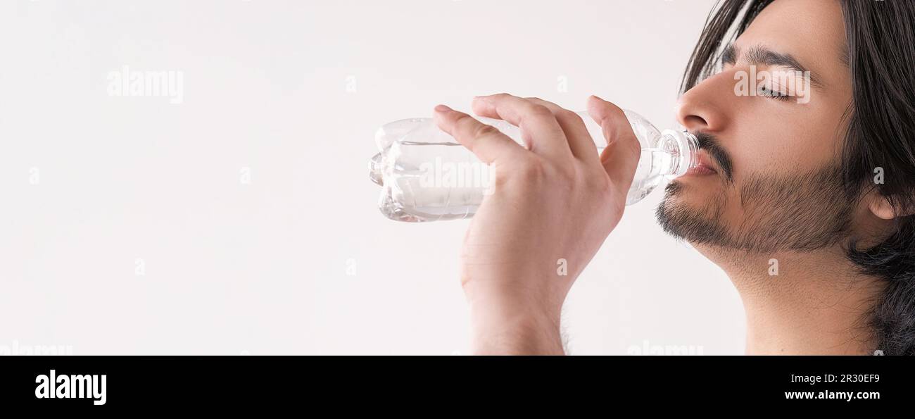 Water balance morning hydration guy drinking enjoy Stock Photo - Alamy