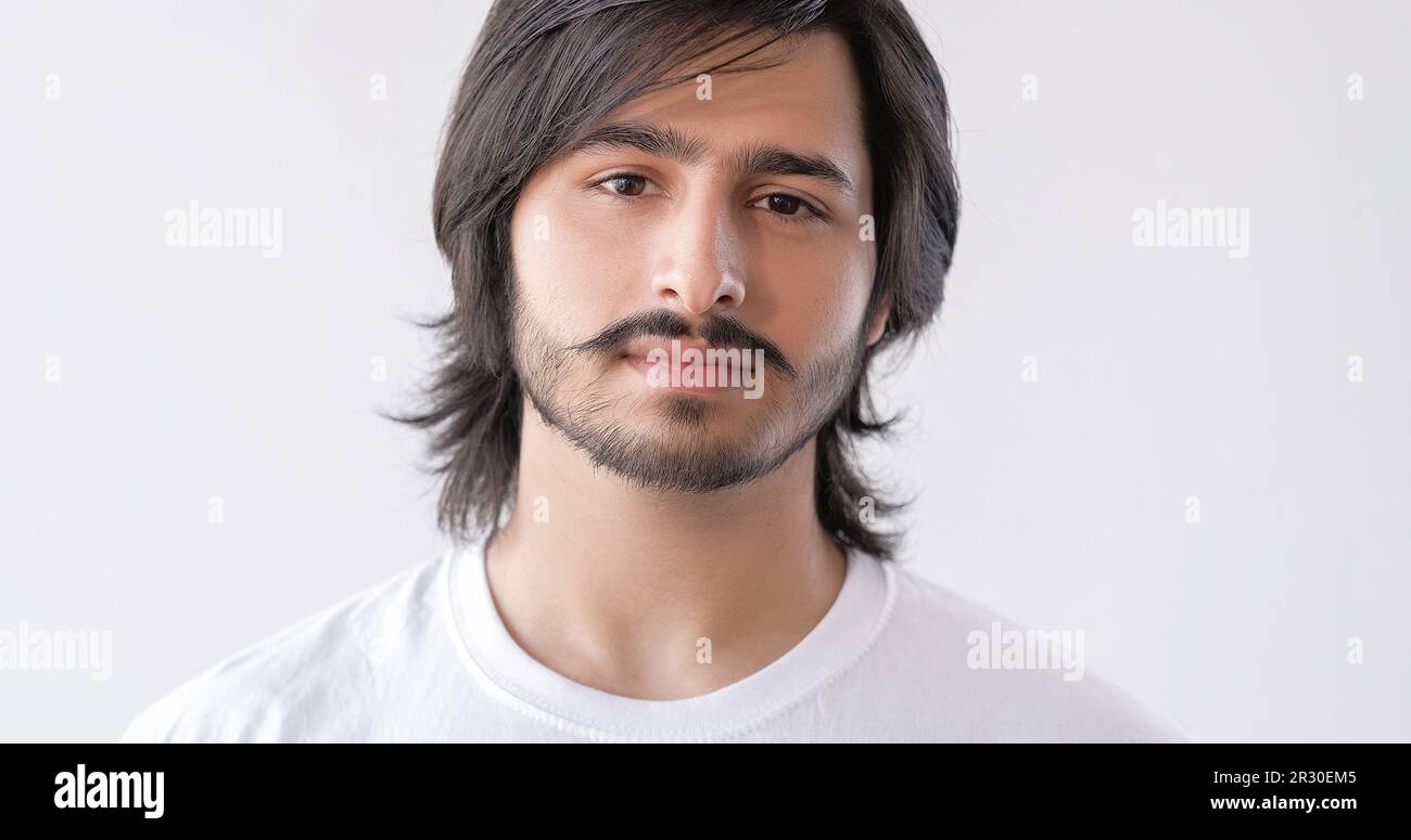 Self-assured face perfect skin dark haired guy Stock Photo - Alamy