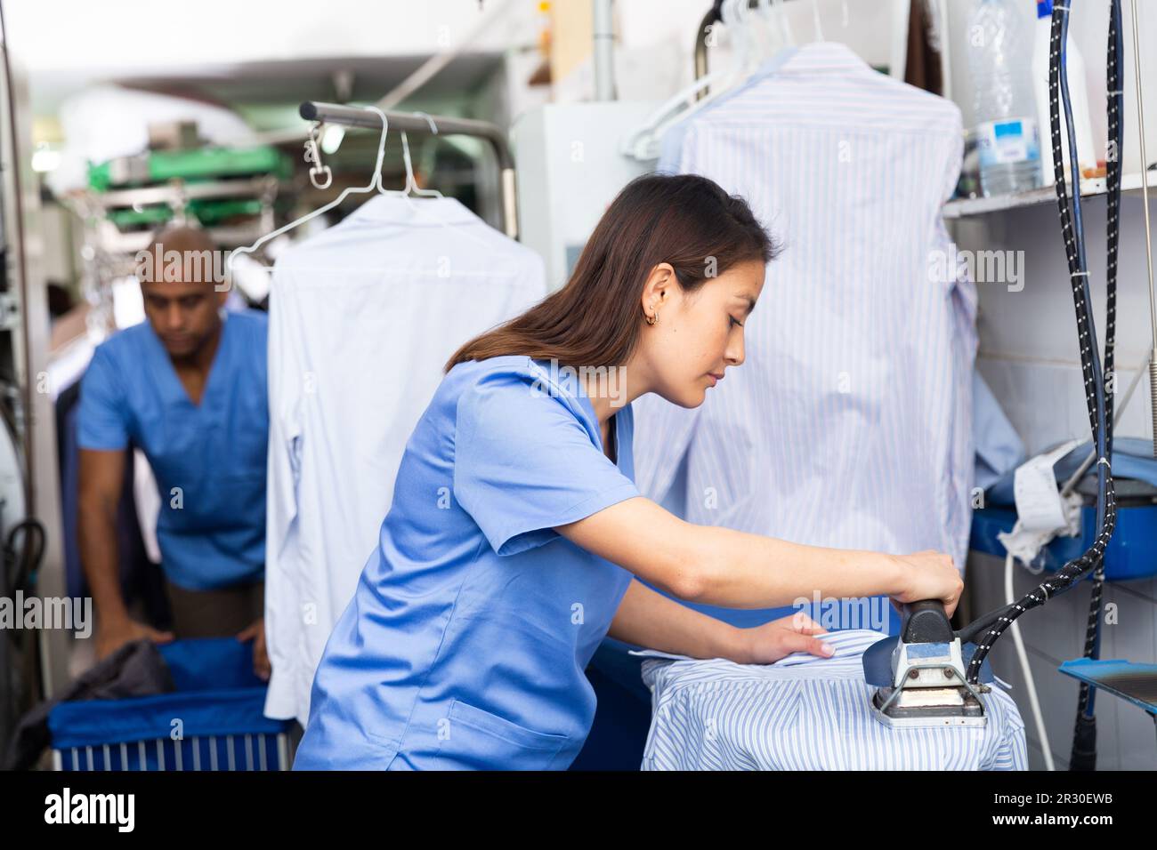Ironing laundry small business hi-res stock photography and images - Alamy