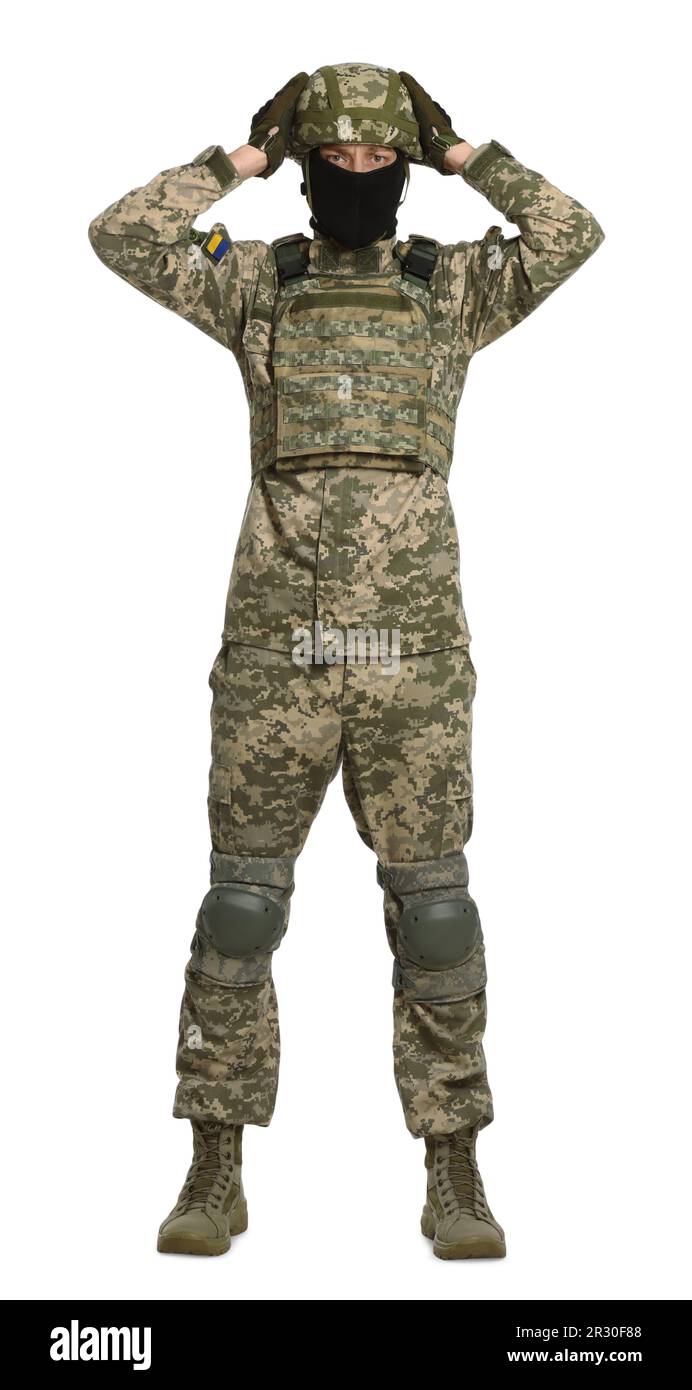 Ukrainian soldier in military uniform, helmet and balaclava on white ...