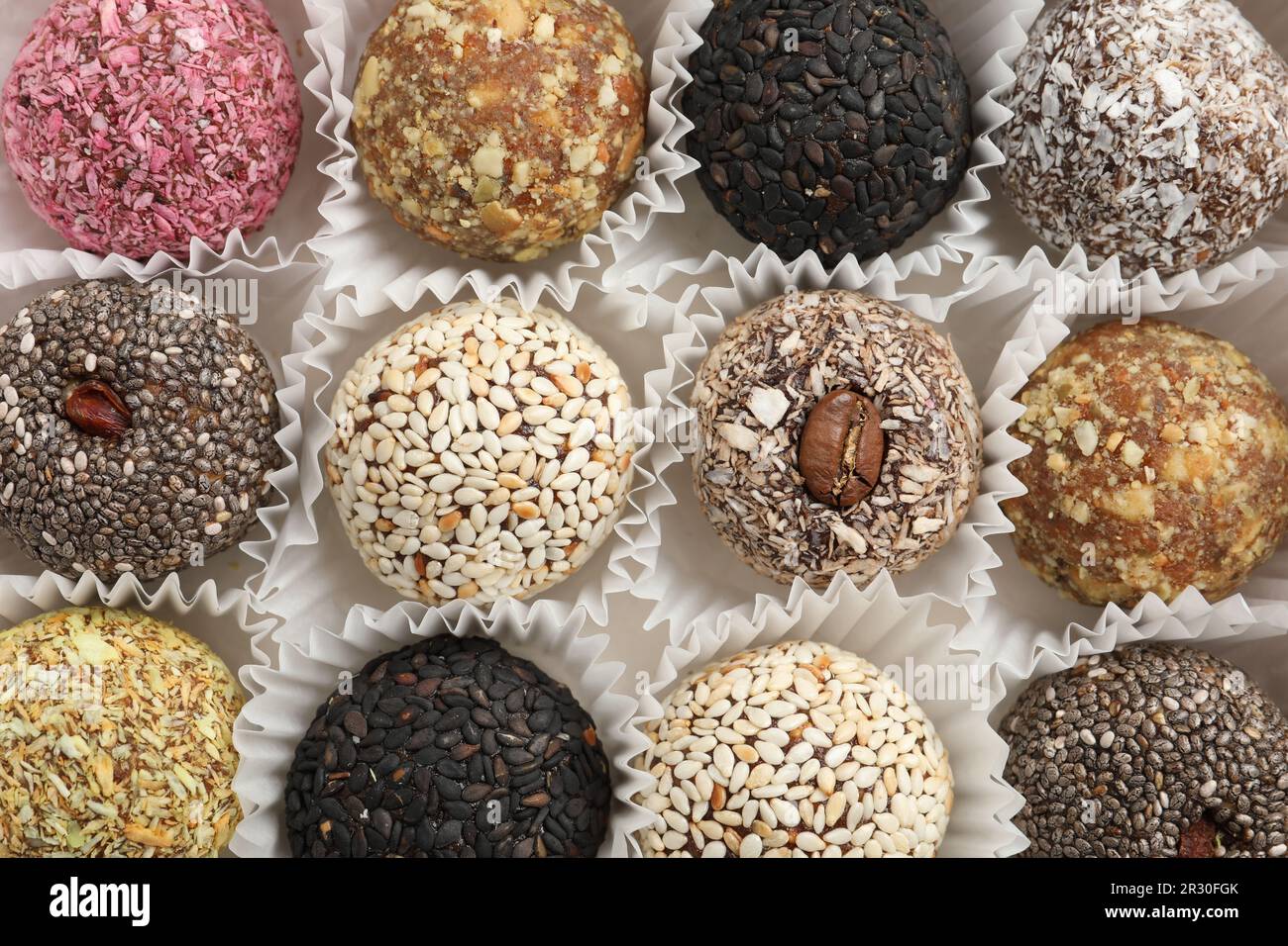 Assortment of different delicious vegan candy balls, top view Stock ...