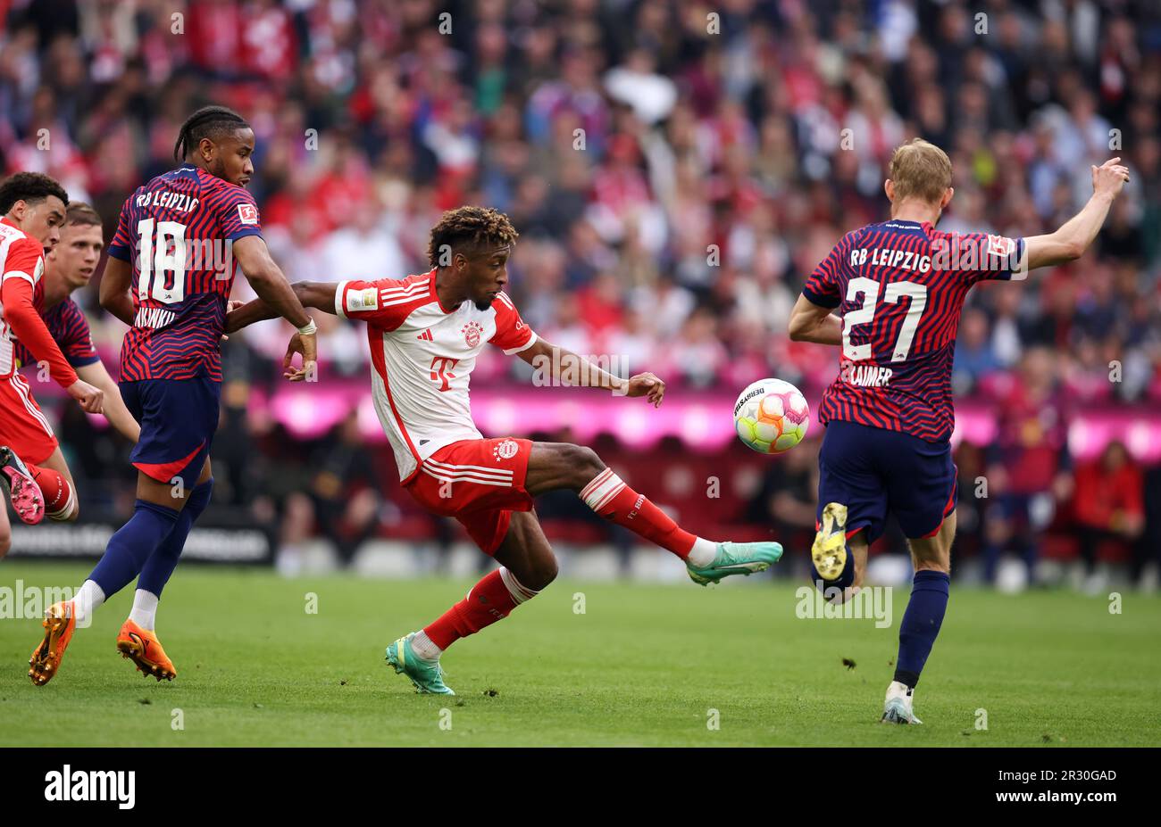Kingsley Coman of Bayern Muenchen Christopher Nkunku of RB Leipzig ...